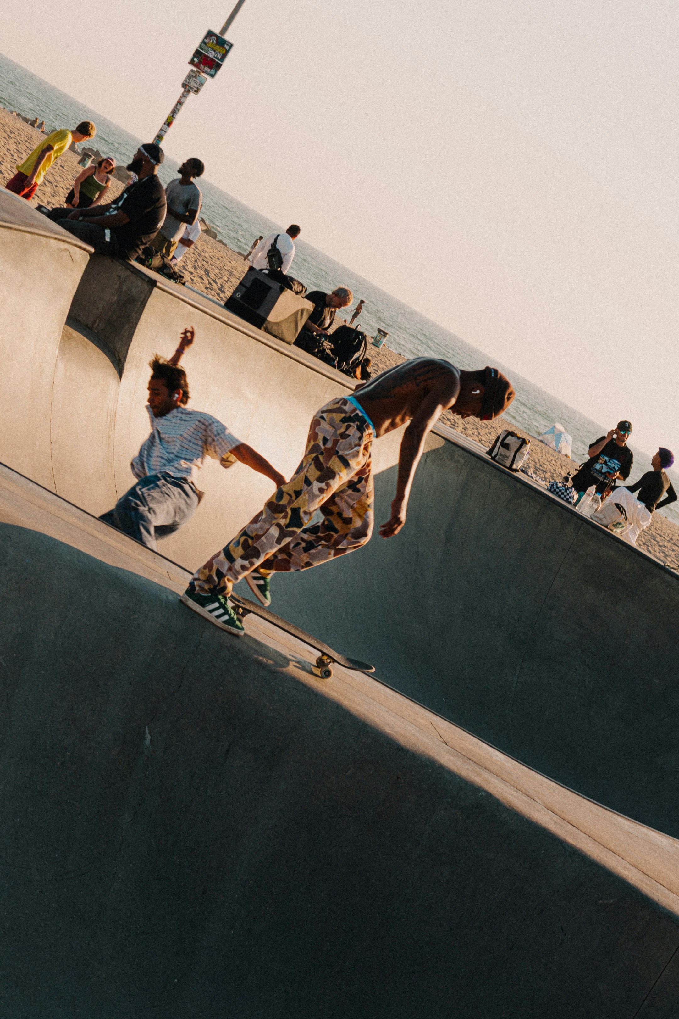 Skateboarders carve the curve: summer momentum at the quivering skate bowl