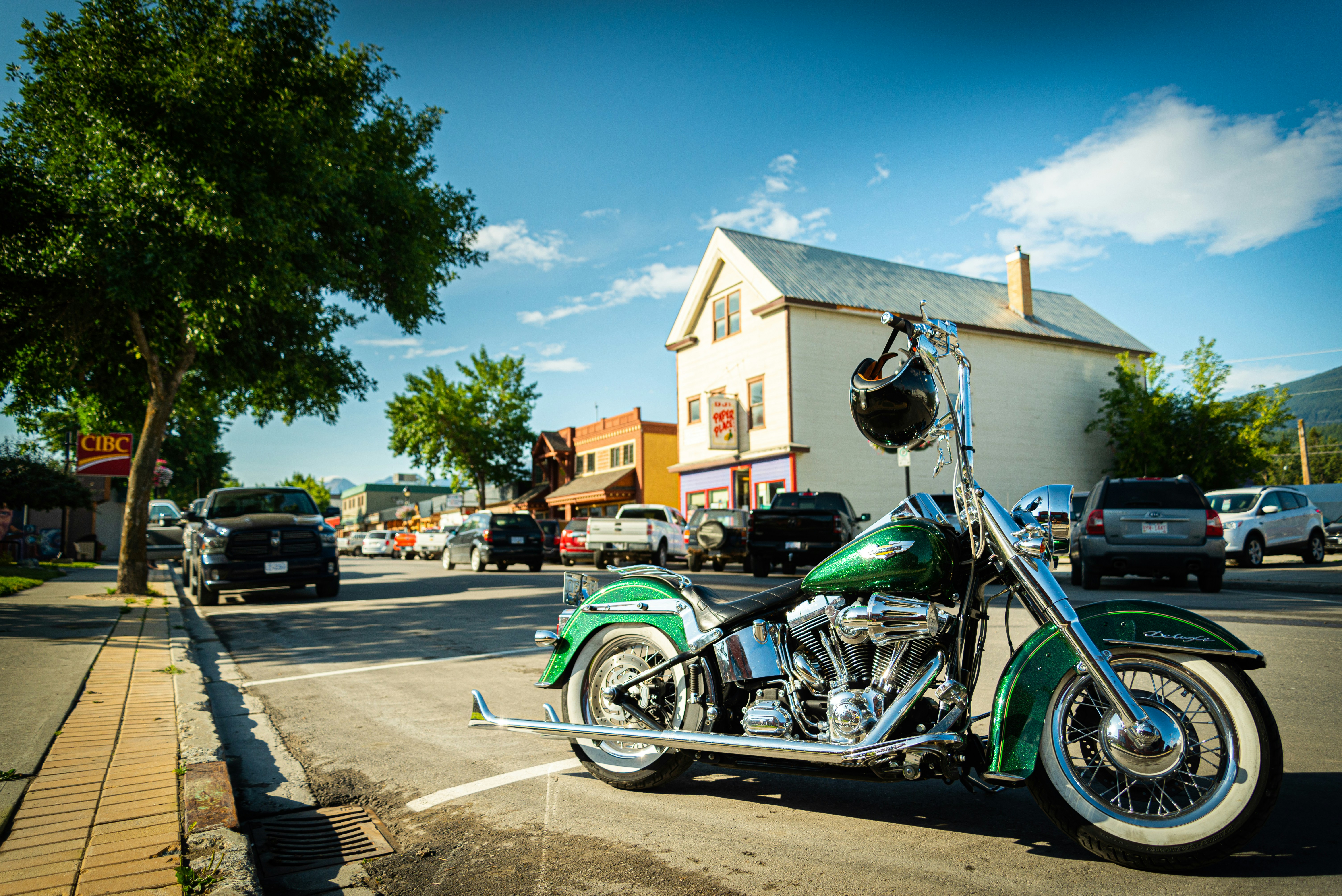 Chrome on the Corner: Neon Green Ride Anchors a Quiet Main Street