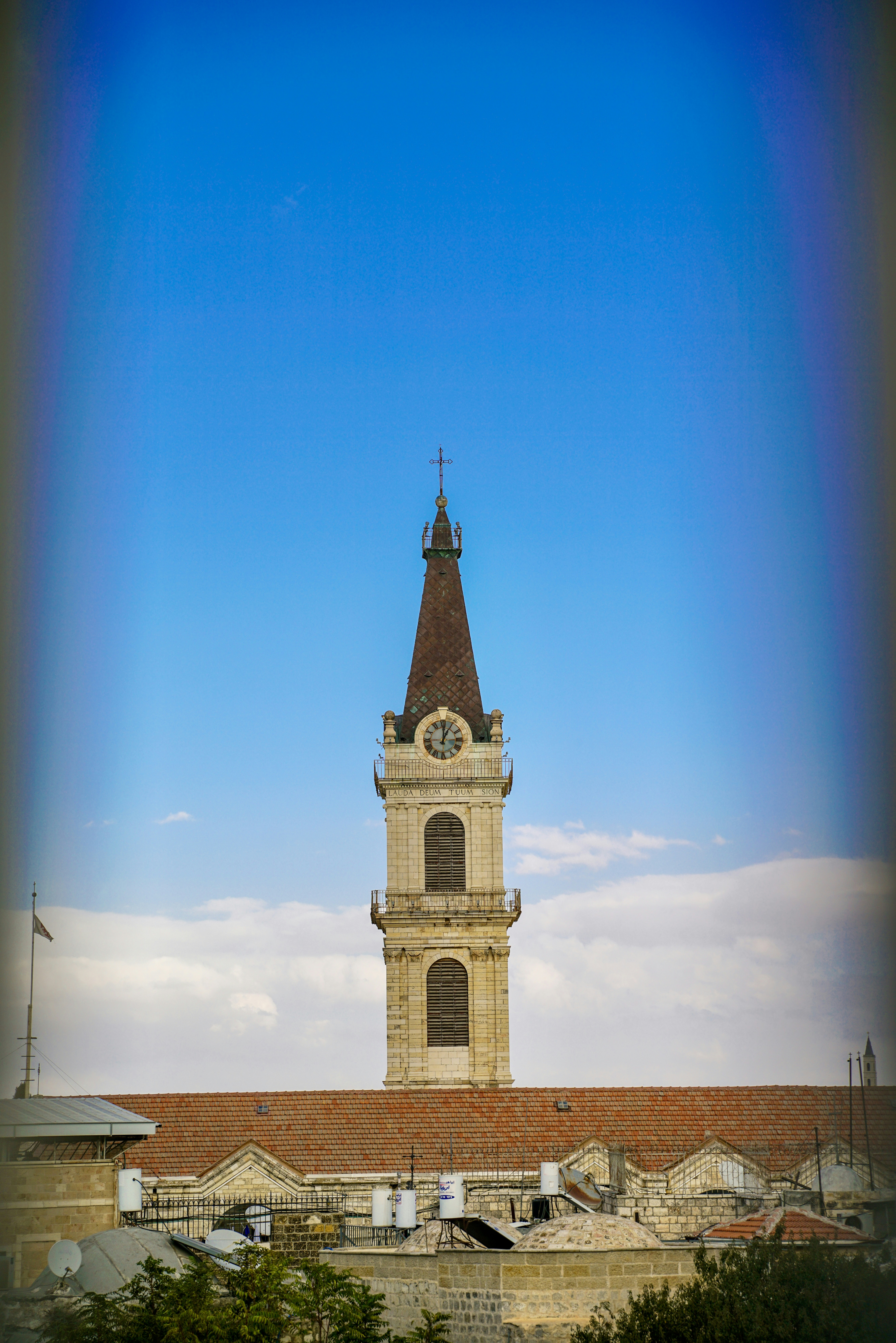 Towering Clock Facade: A Belfry Reaching Toward the Sky
