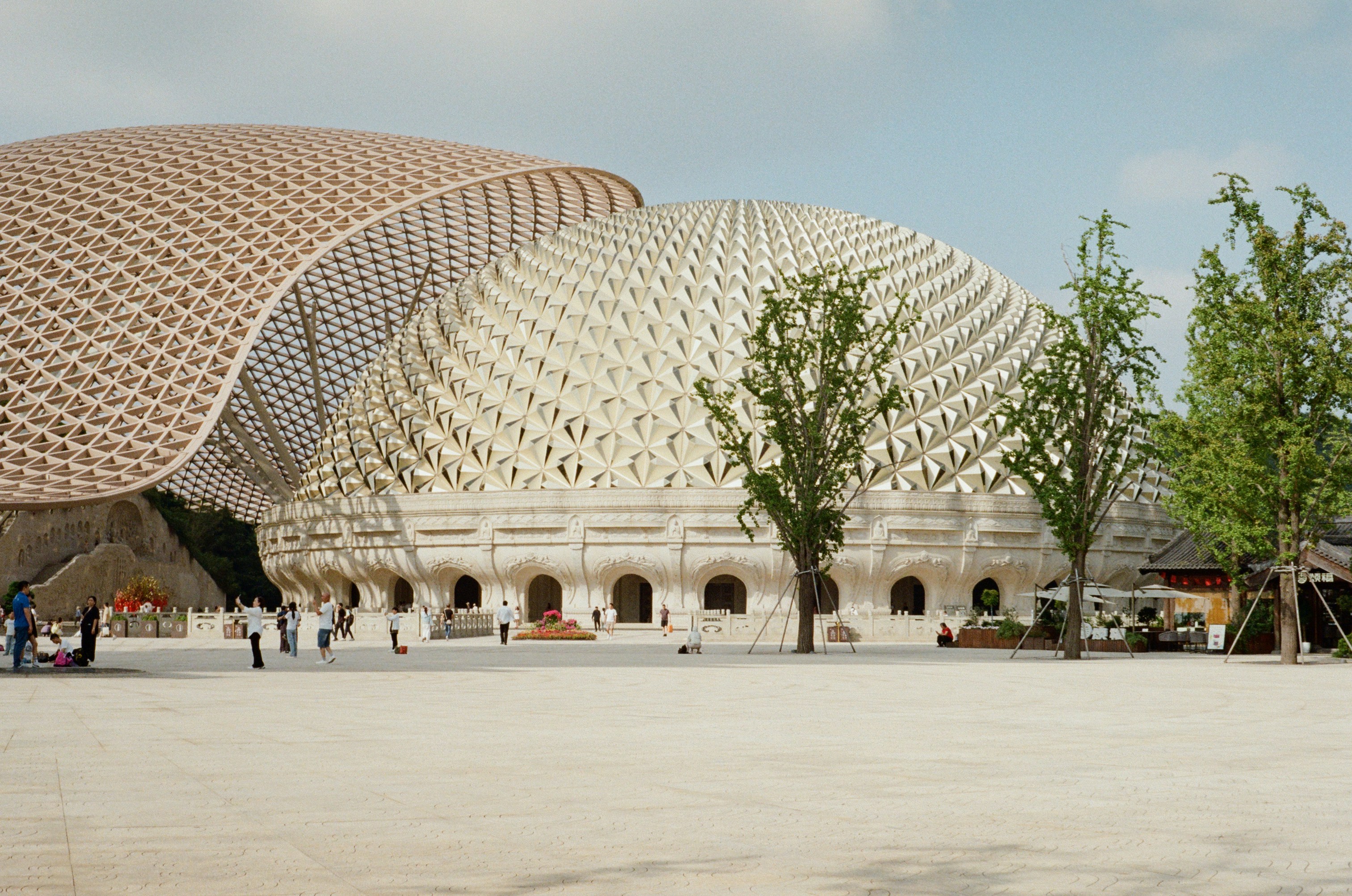 Modern domed buildings with intricate facades and trees. photo – Free ...