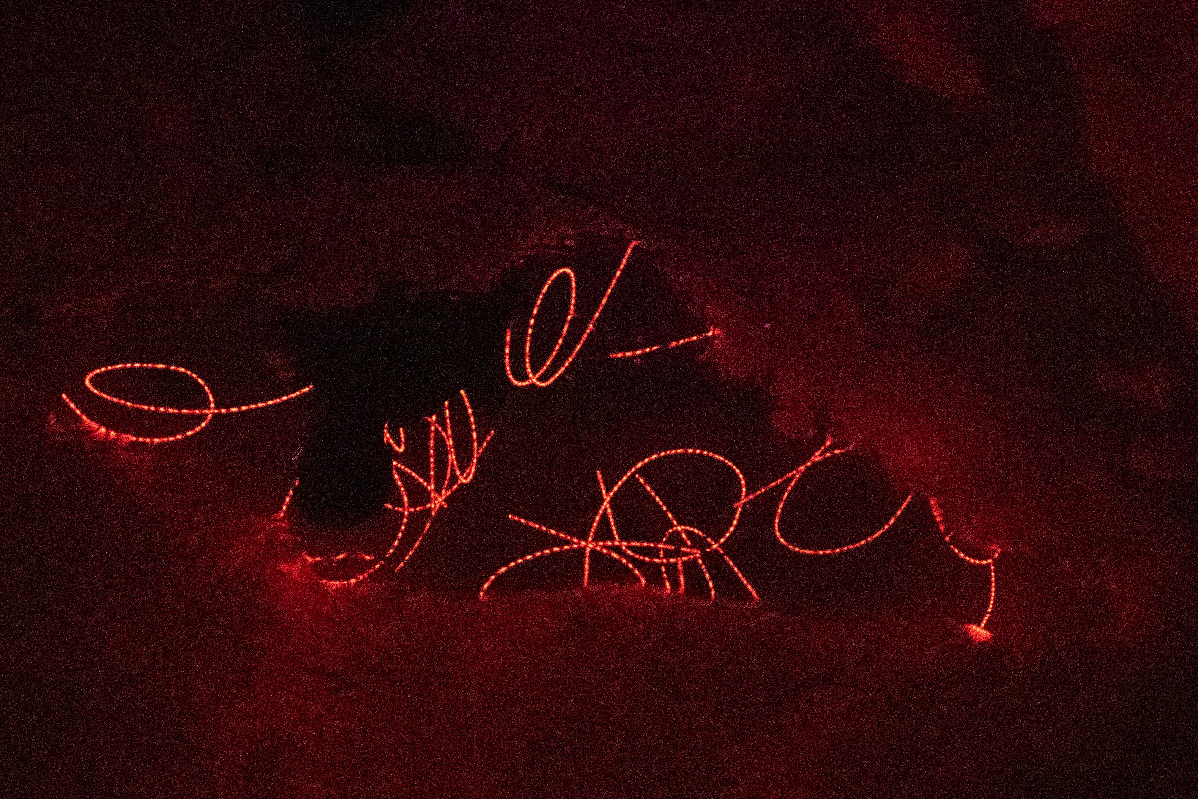Red-hot Scribbles in a Dark Wedge