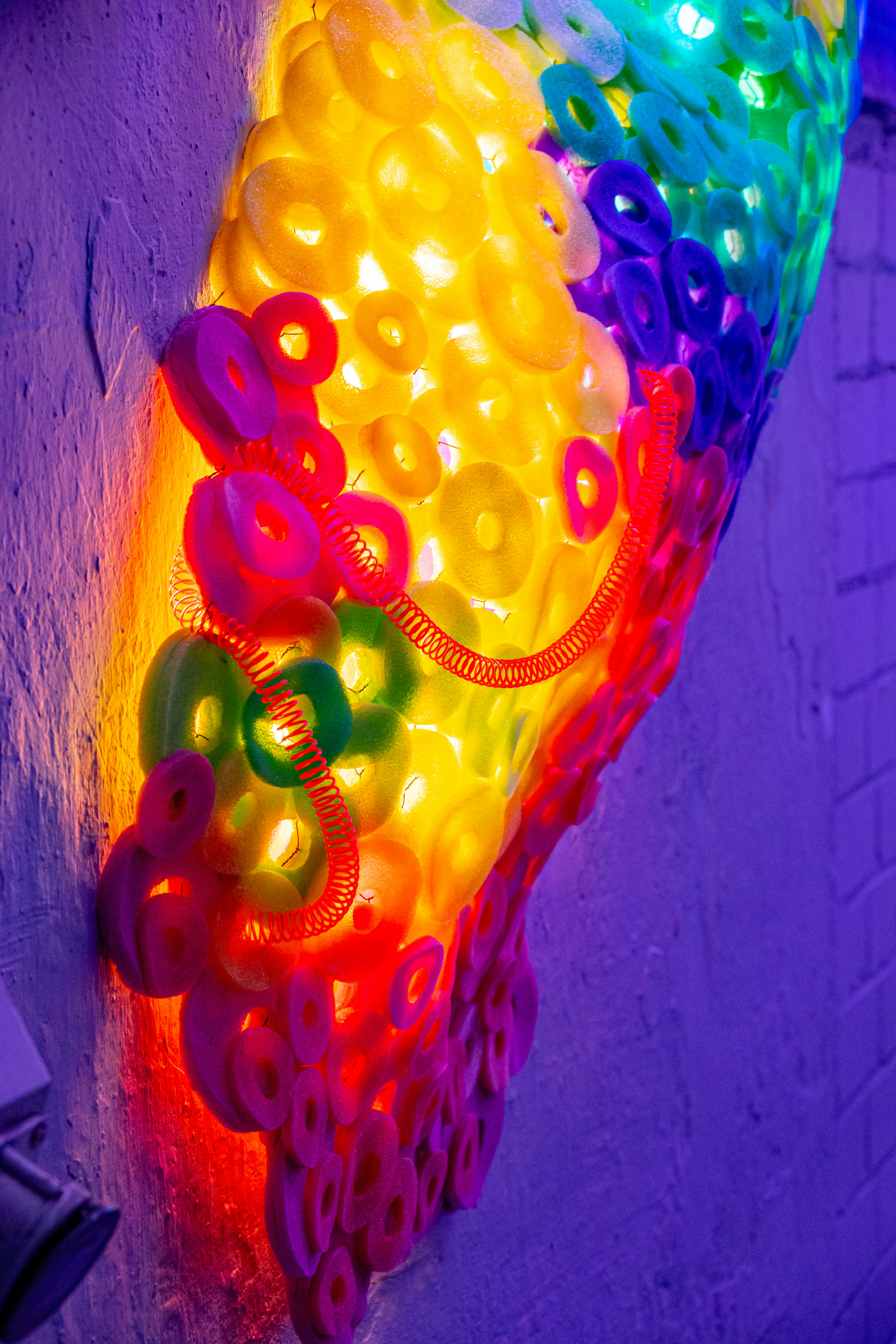 Neon Candy Flow: A Curved Rainbow of Light