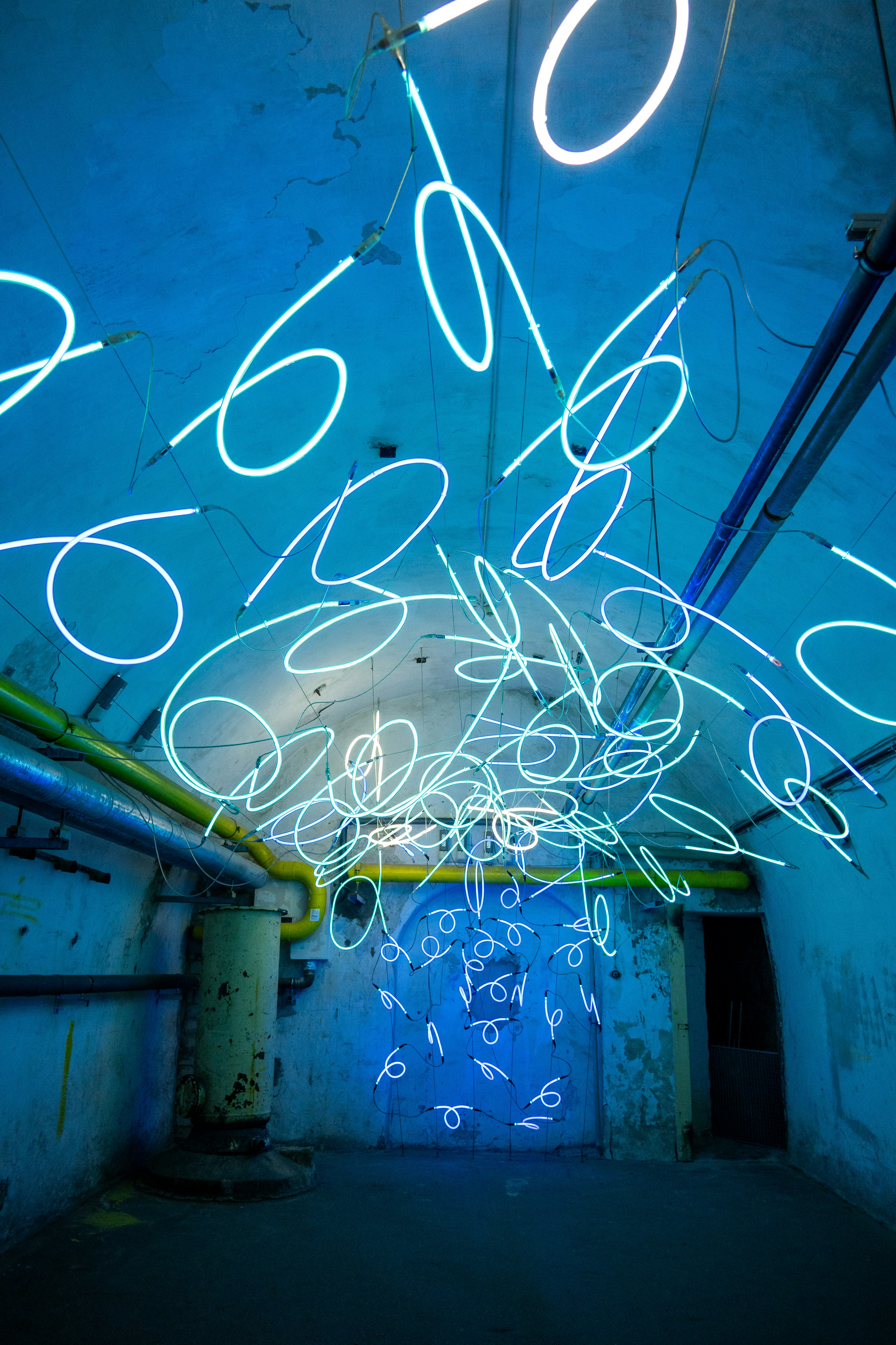 Neon Constellations in an Industrial Blue Void