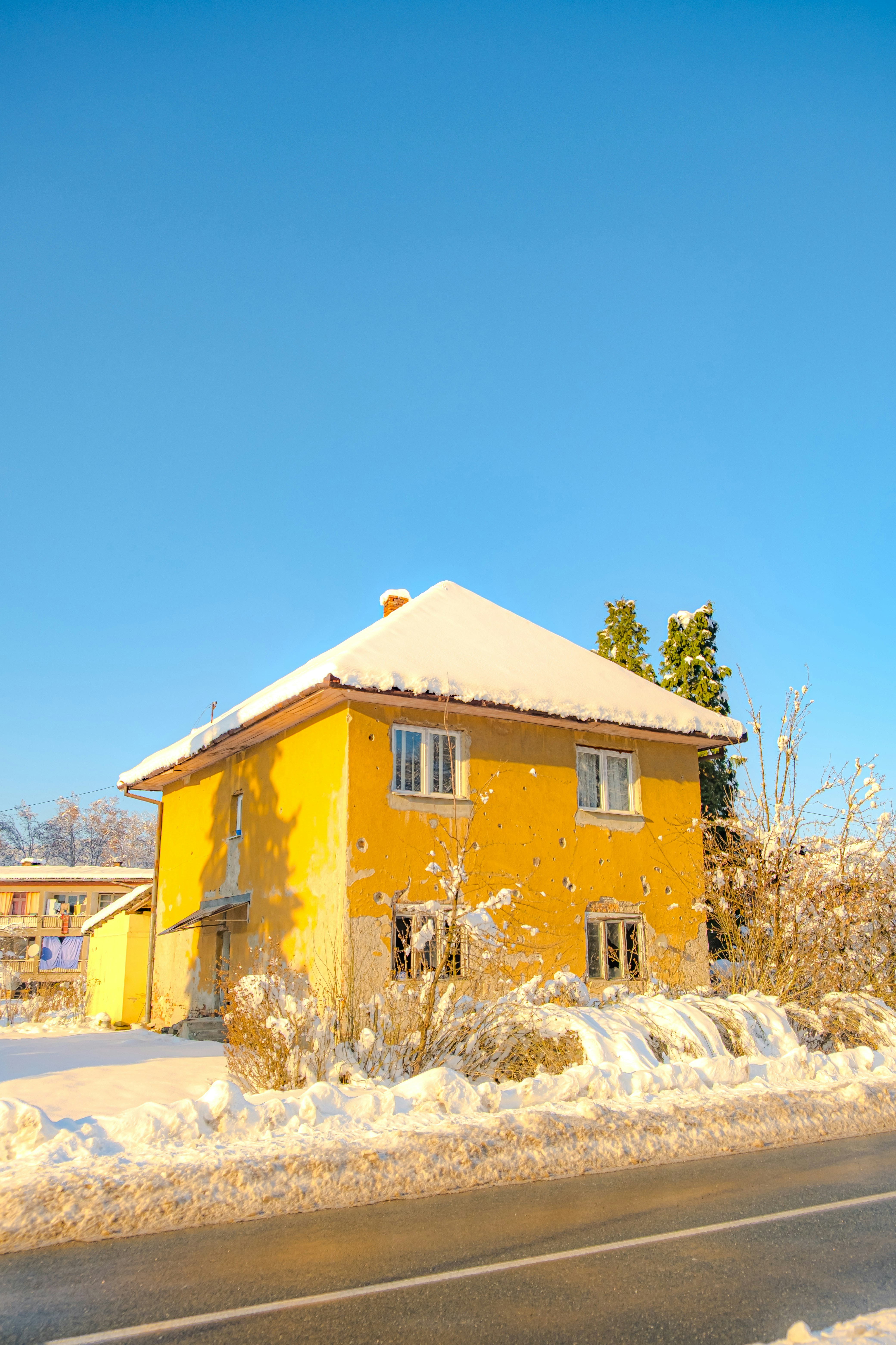 Golden Cottage in Winter Light