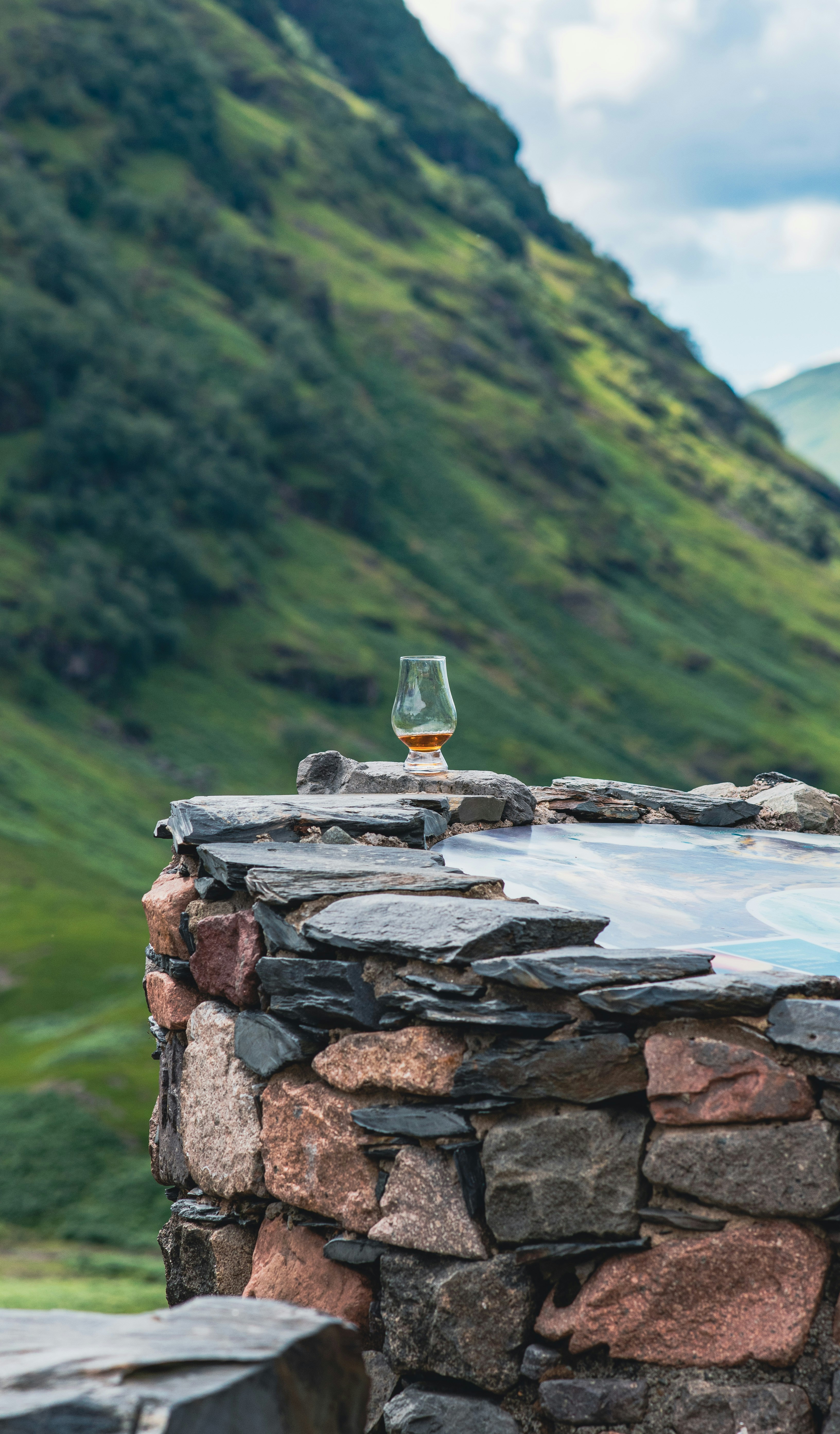Glassed Amber on Stone Terrace Against Copper Mountains