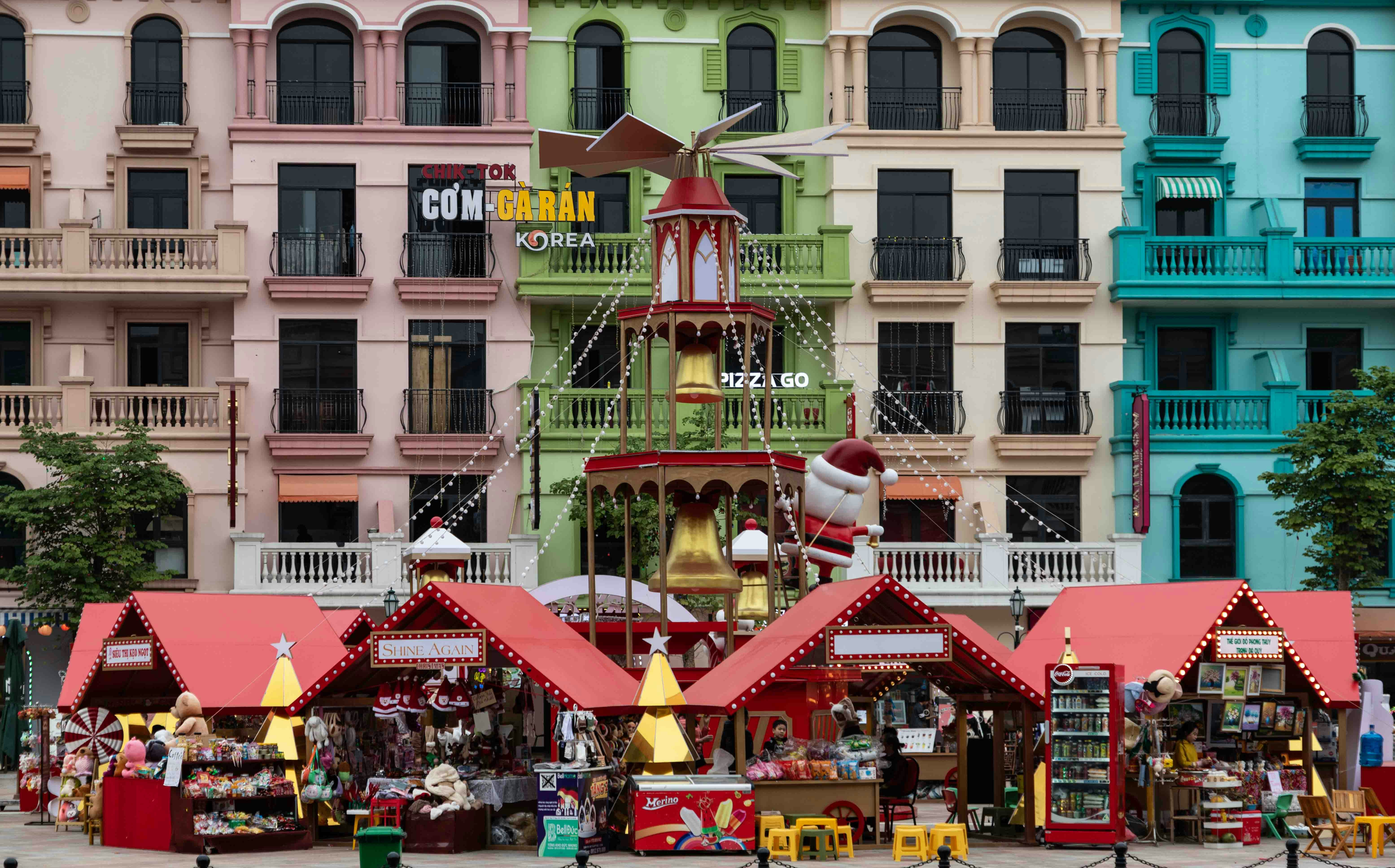 Candy-Colored Facades and Market in a Sunlit Plaza