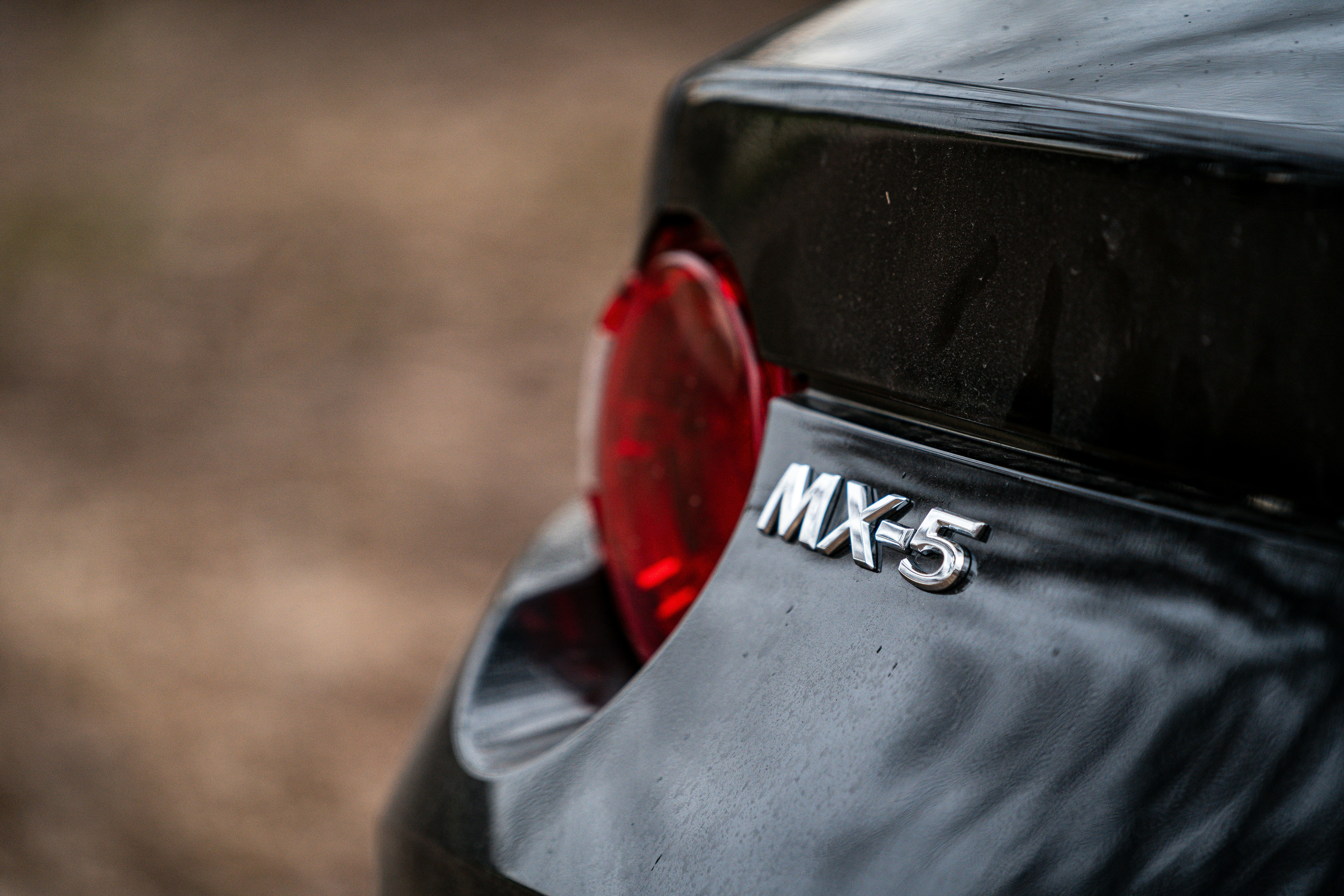 MX-5 Emblem in Focus: A Glimpse of the Rear Charm