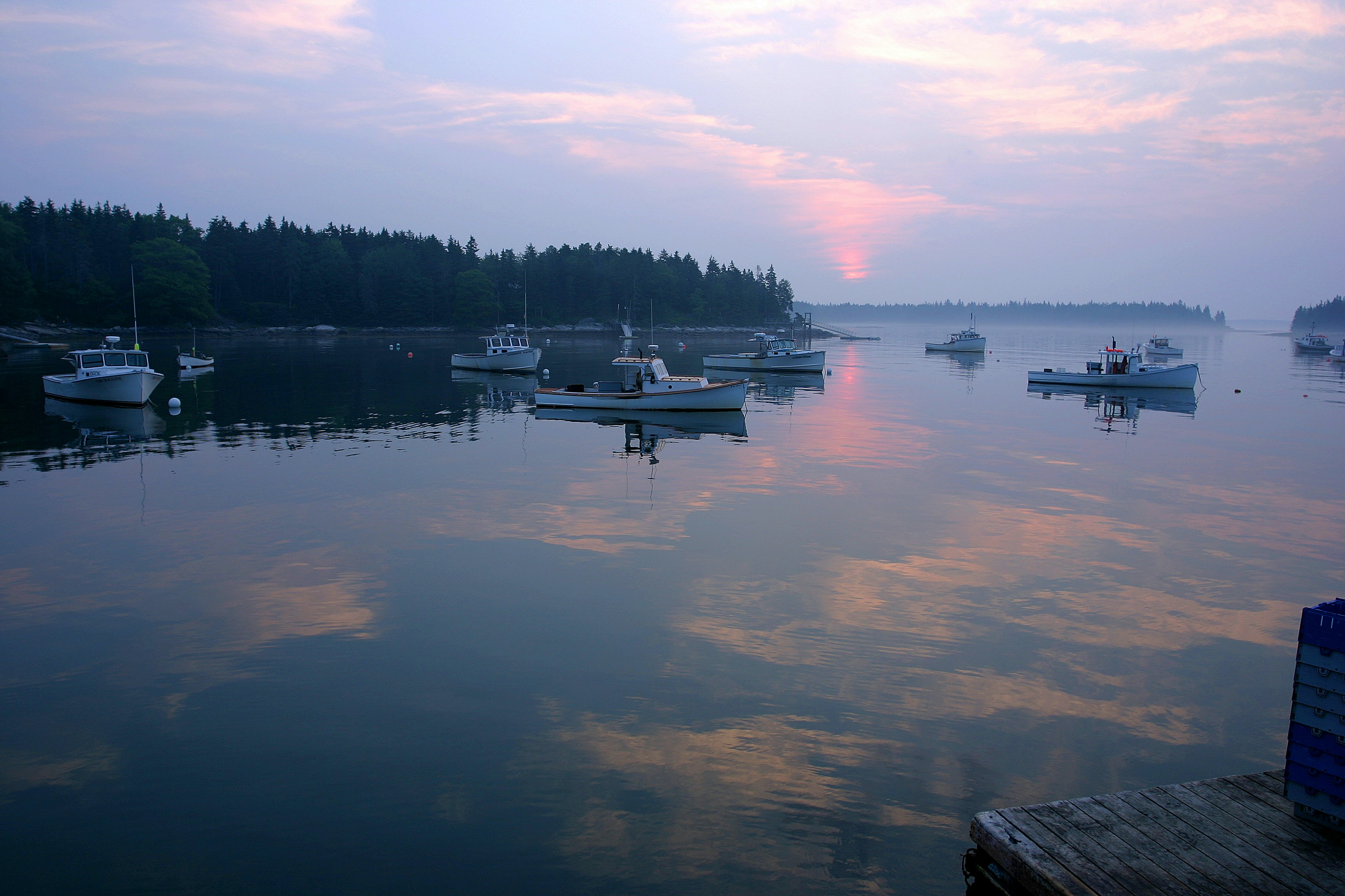 Dusk Harbor: Boats Rest on Glassy Waters