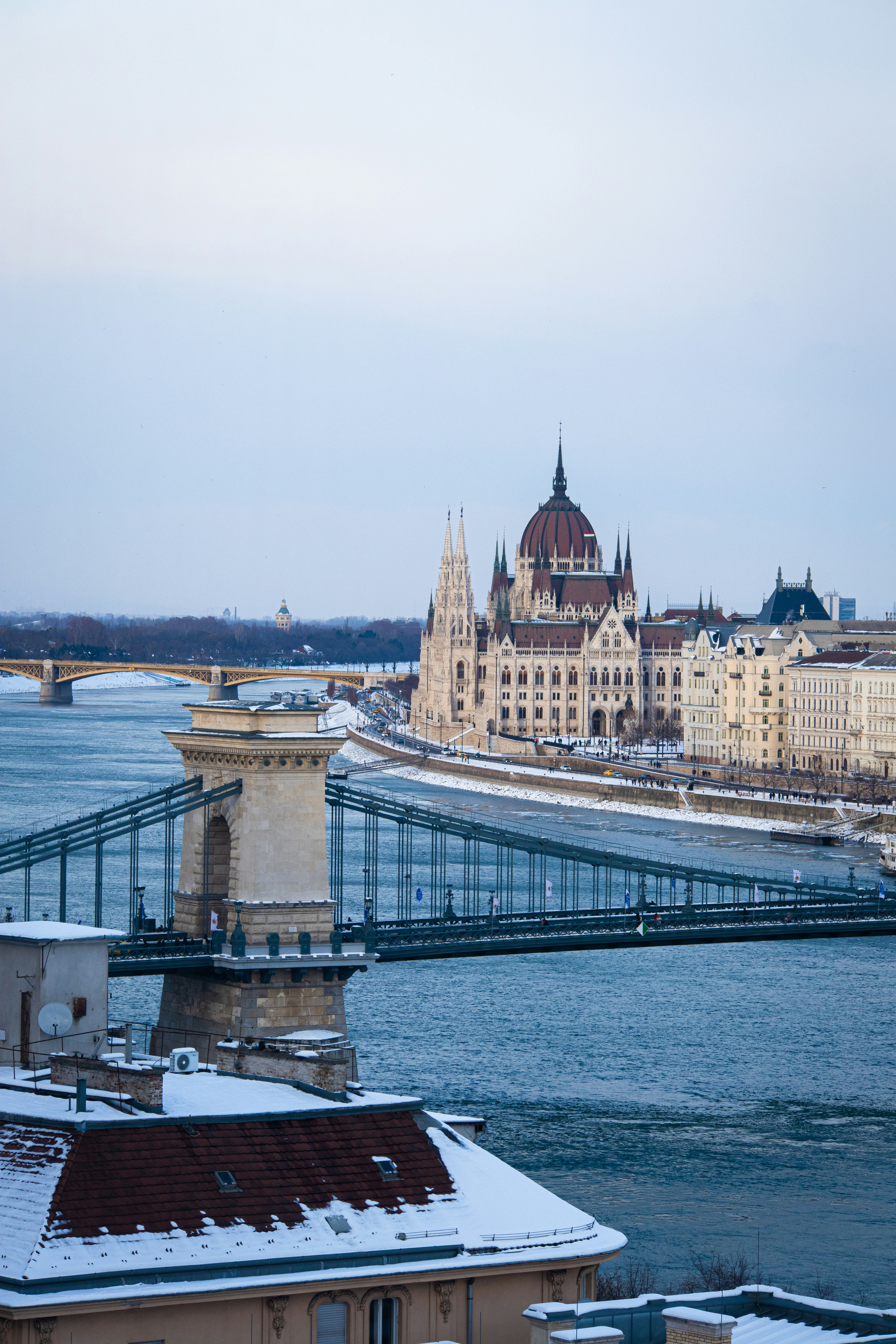 Hungarian Parliament and Chain Bridge Dawnlee: Snow-kissed Danube Panorama