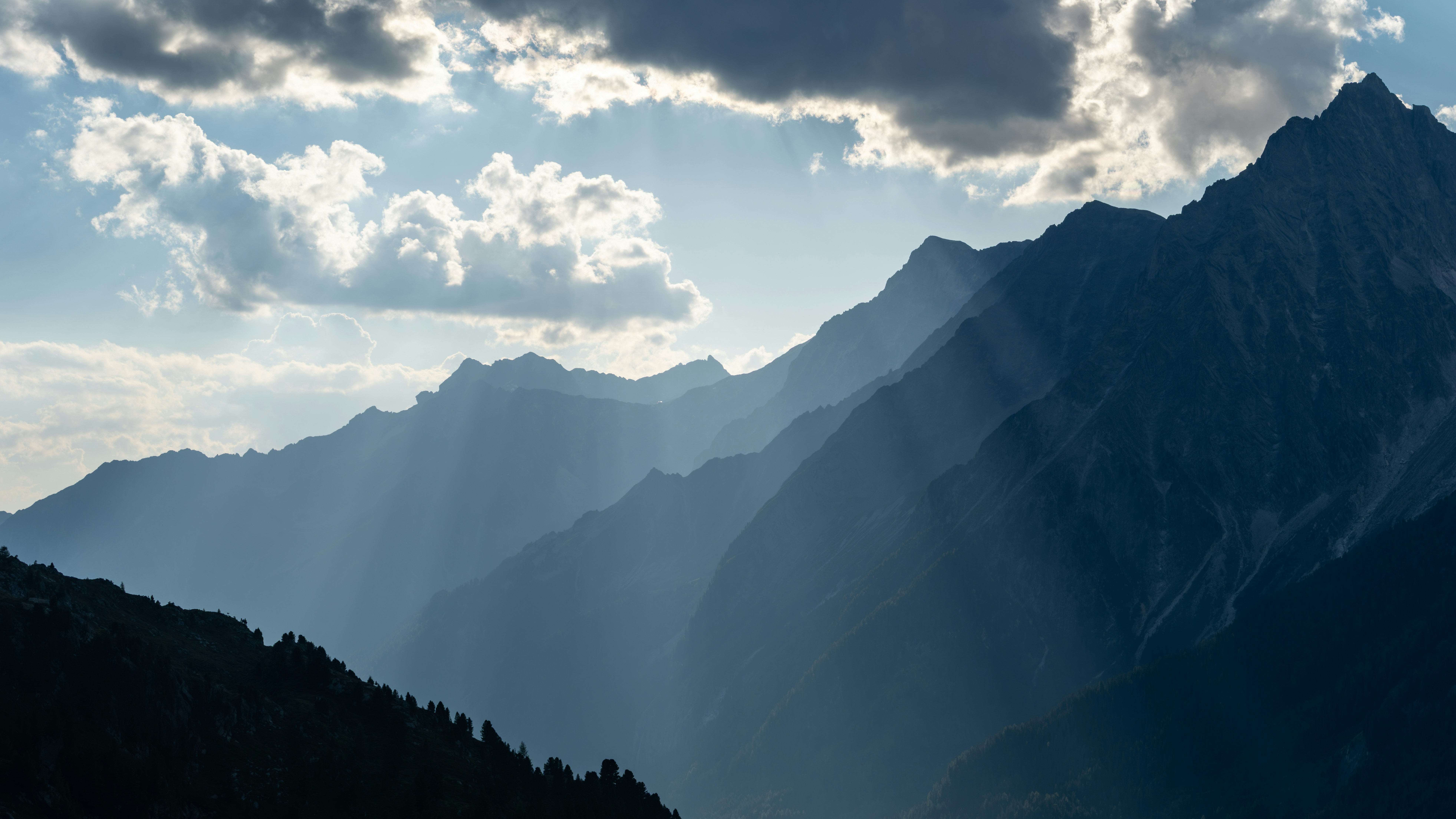 Sunbeams Piercing the Silent Ridge