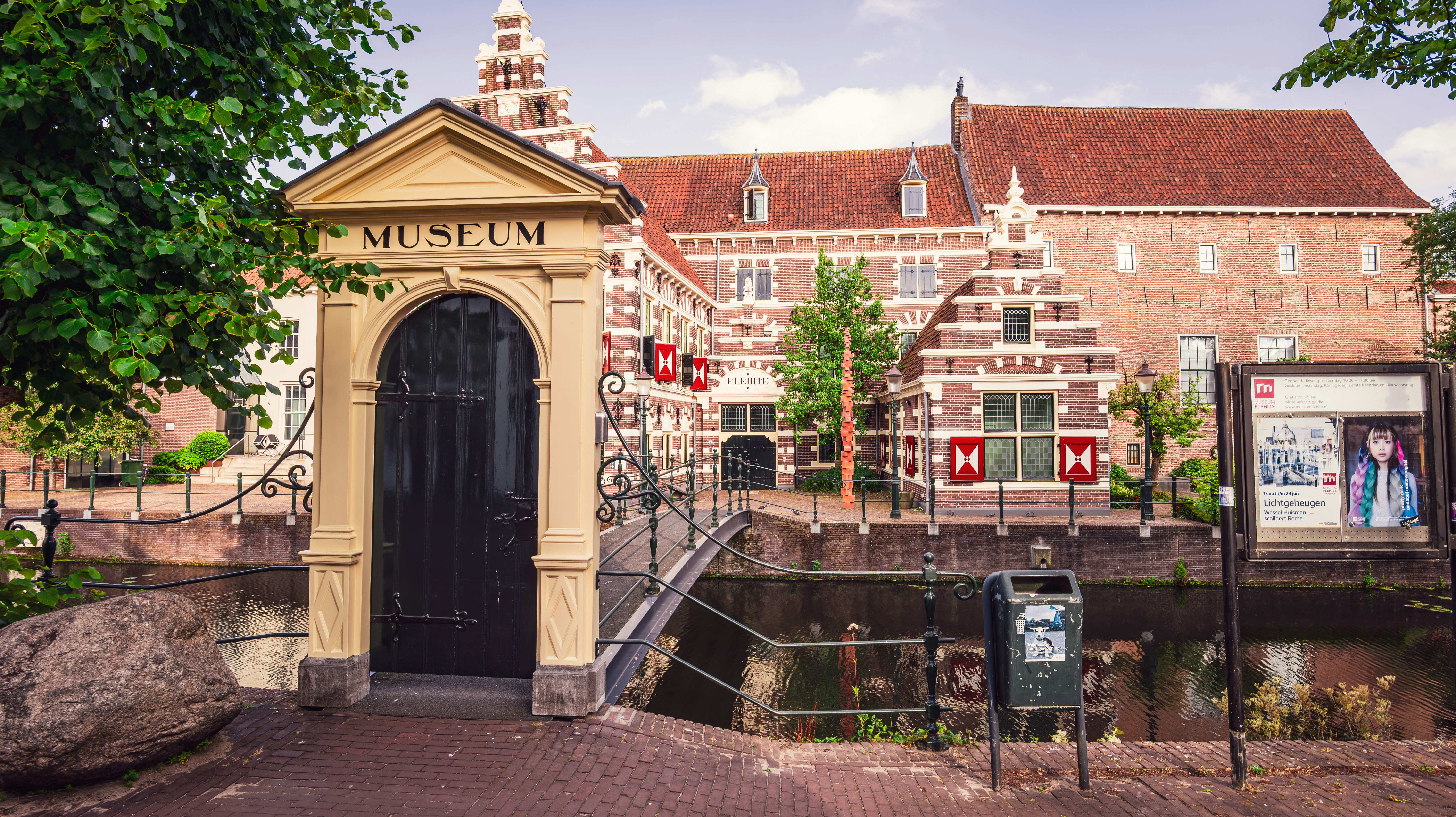Entrance of the Centraal Museum complex in Utrecht, Netherlands, with historic brick architecture and canal surroundings.