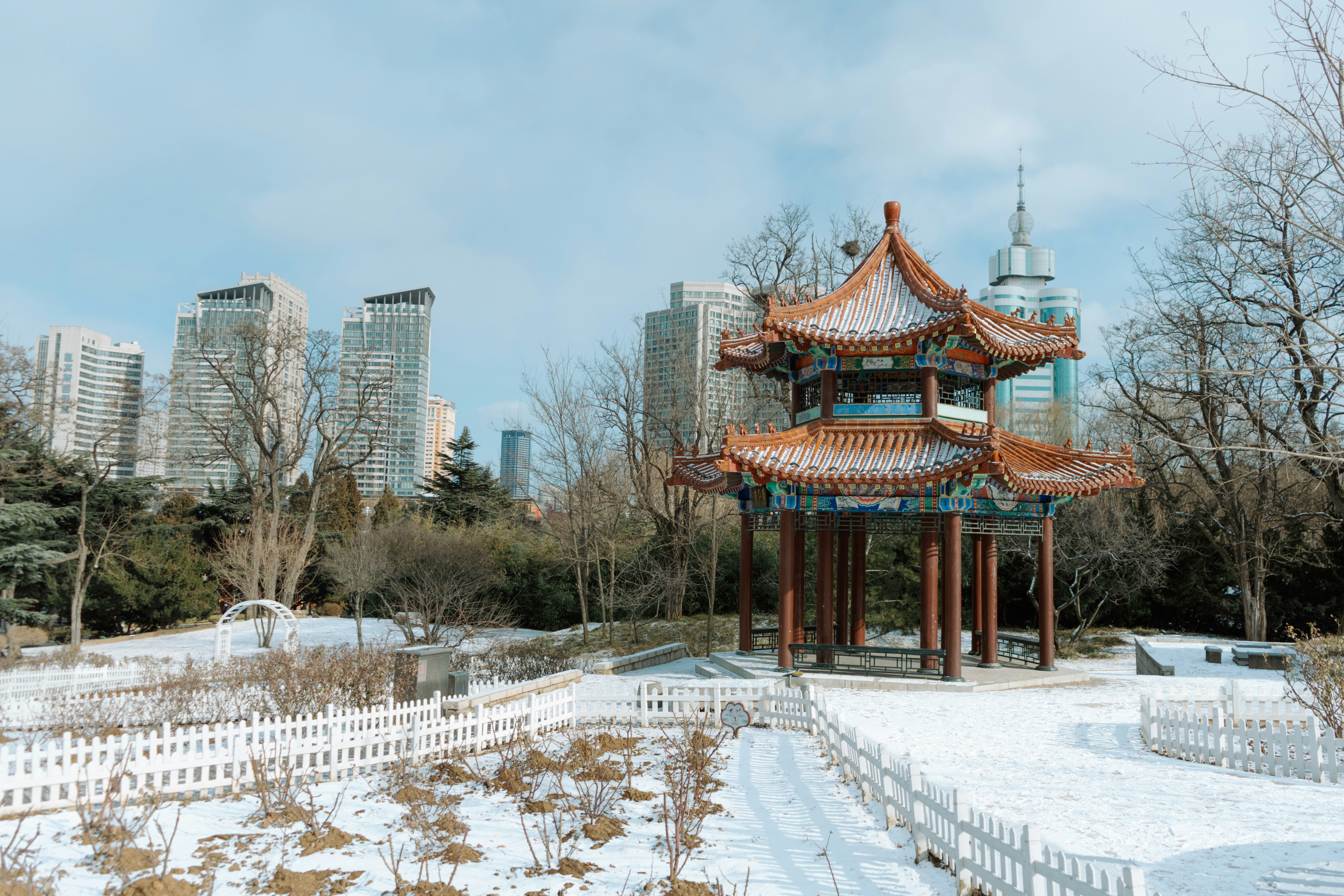 Snow-Kissed Pavilion Amid City Hex