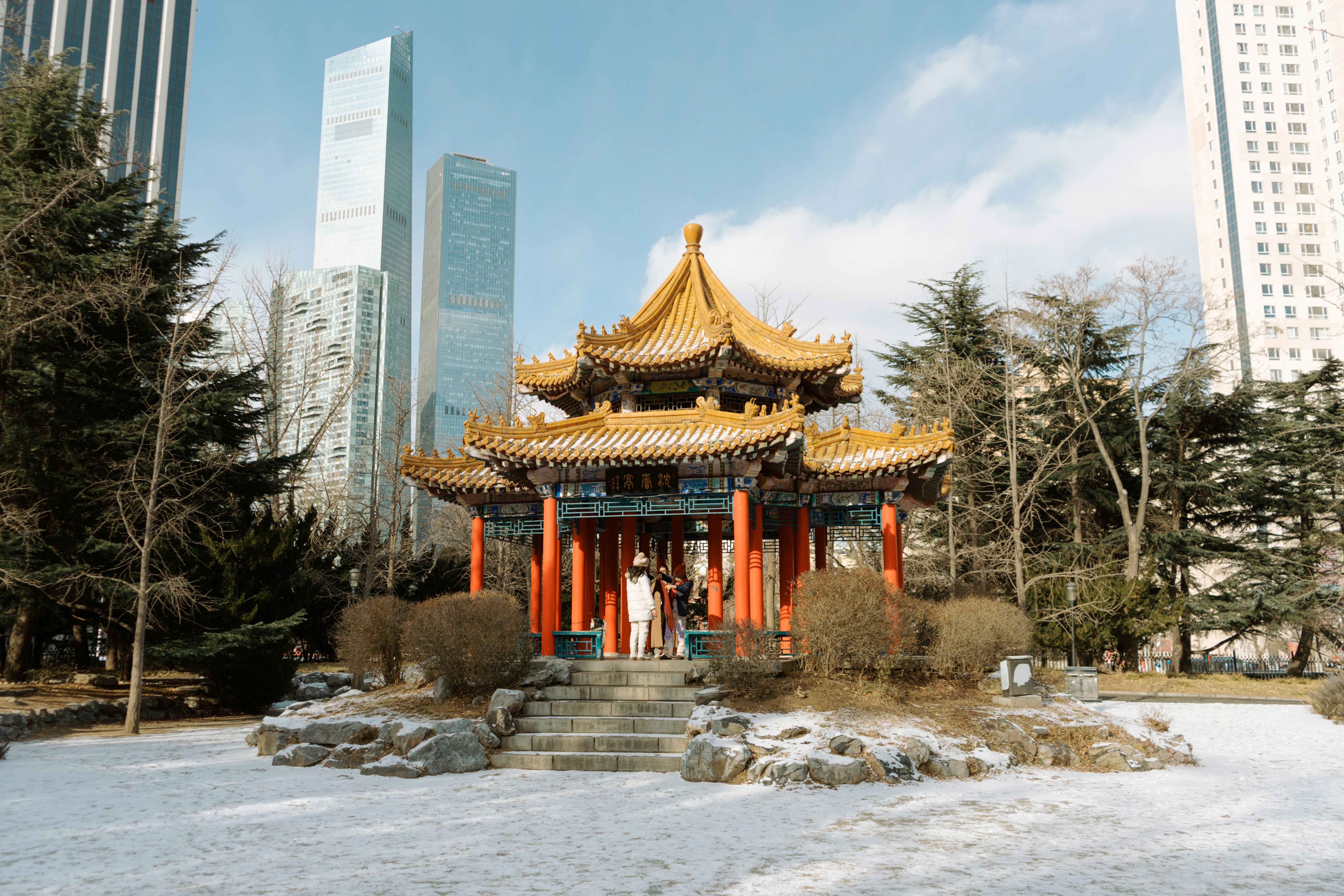 Temple in the Shadow of Glass Towers