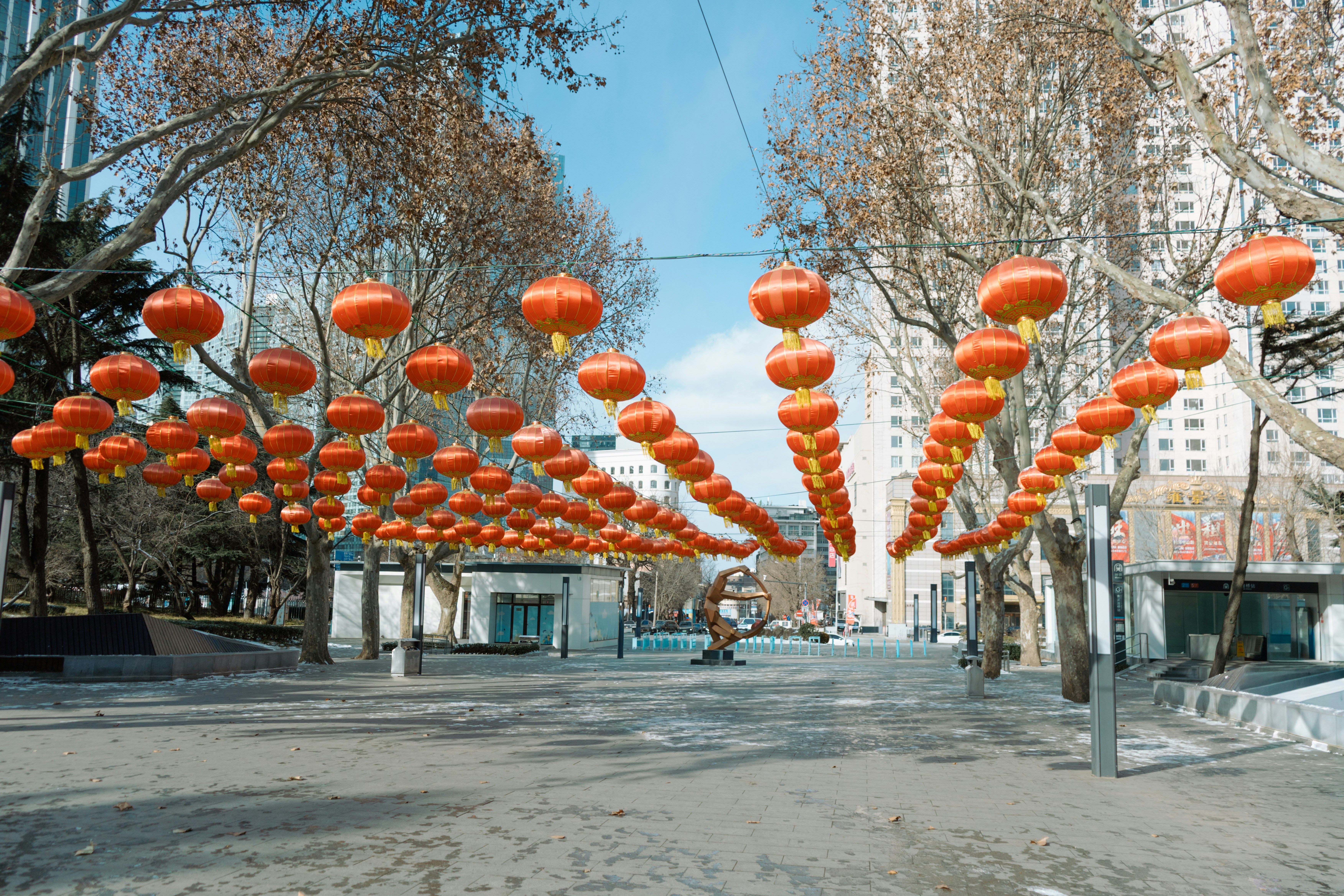 Lantern Lines Over a City Square