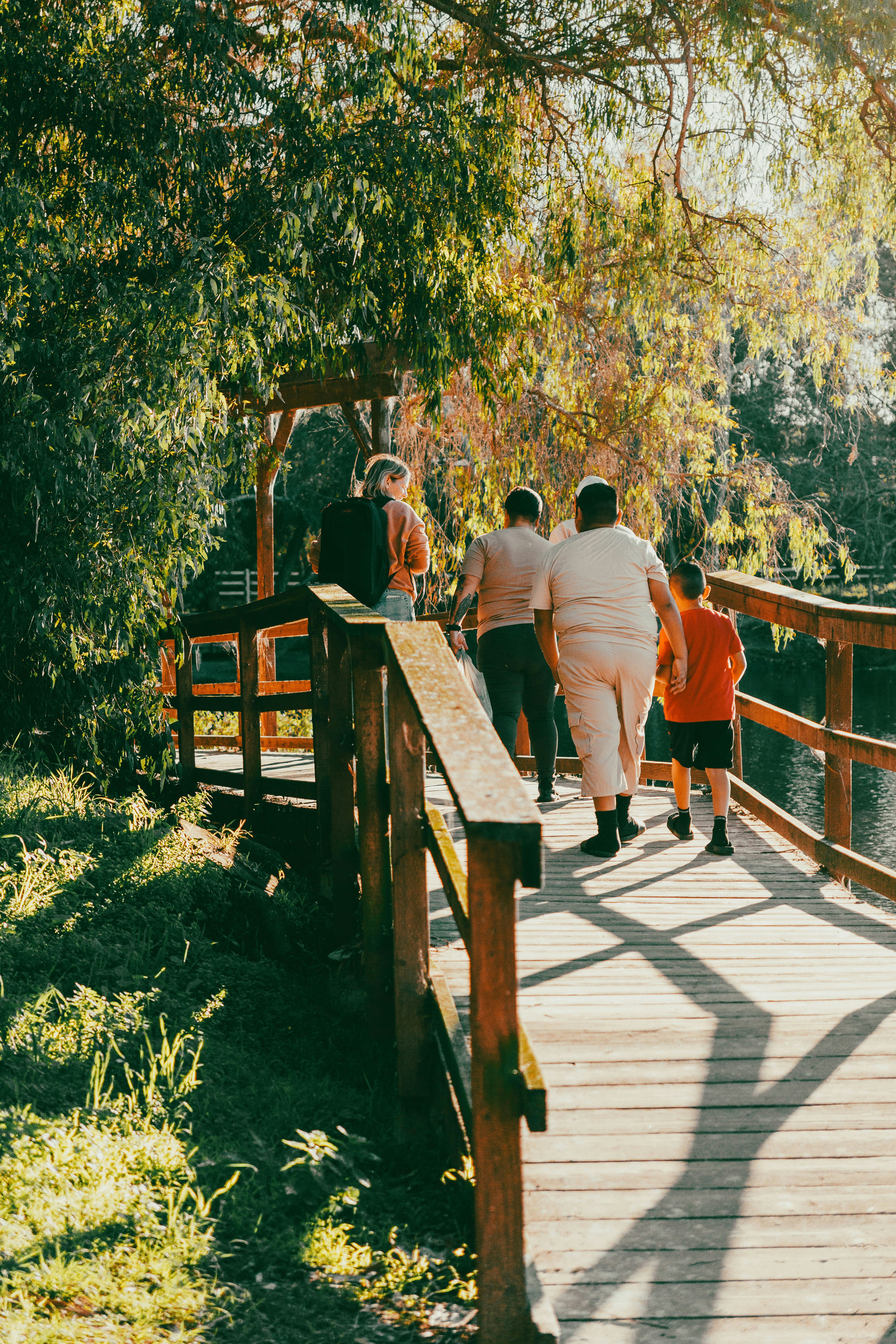 Wooden Bridge Morning: A Family Walk Under Golden Leaves