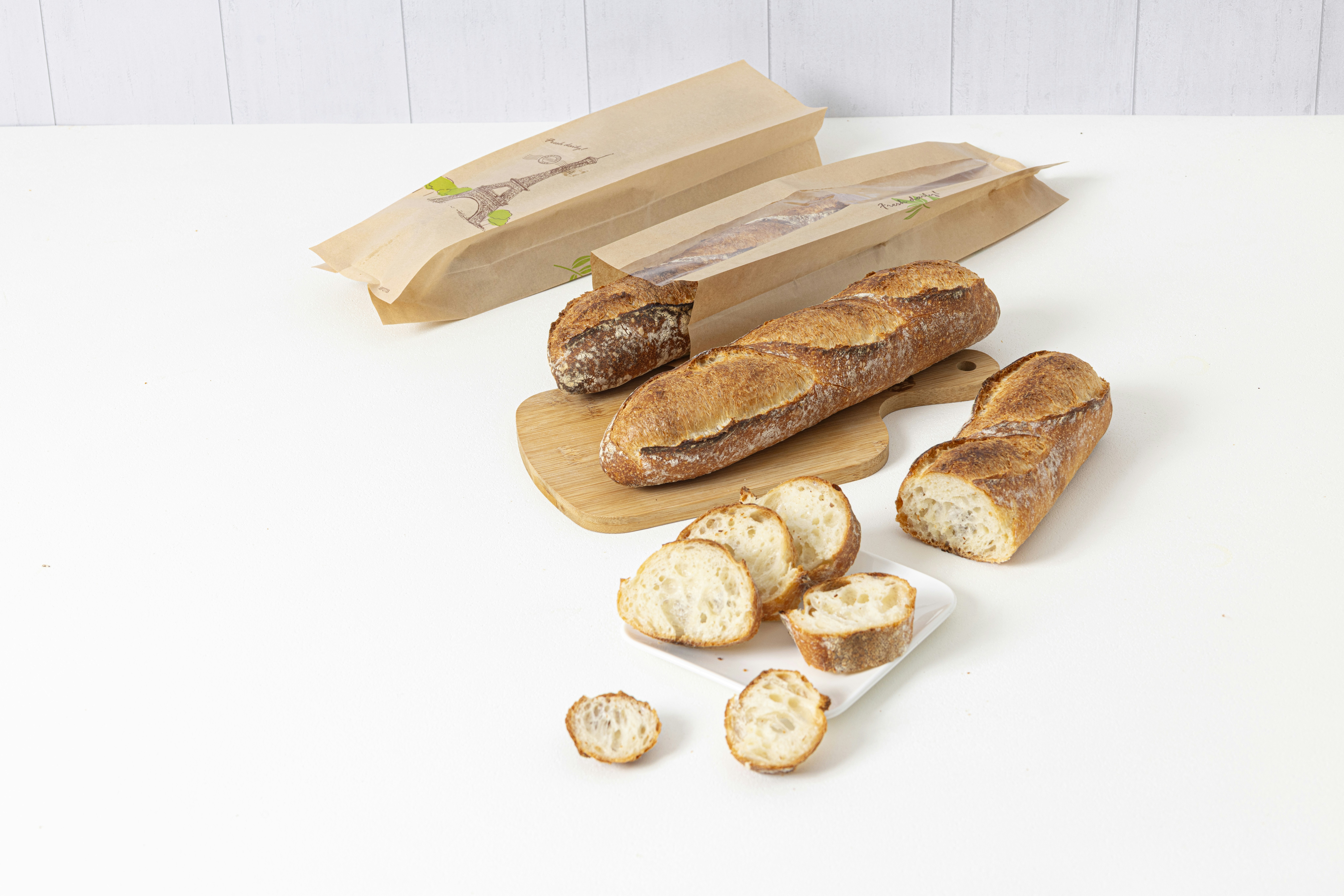 Crust and Crumbs: A Quiet Bread Break on a White Counter