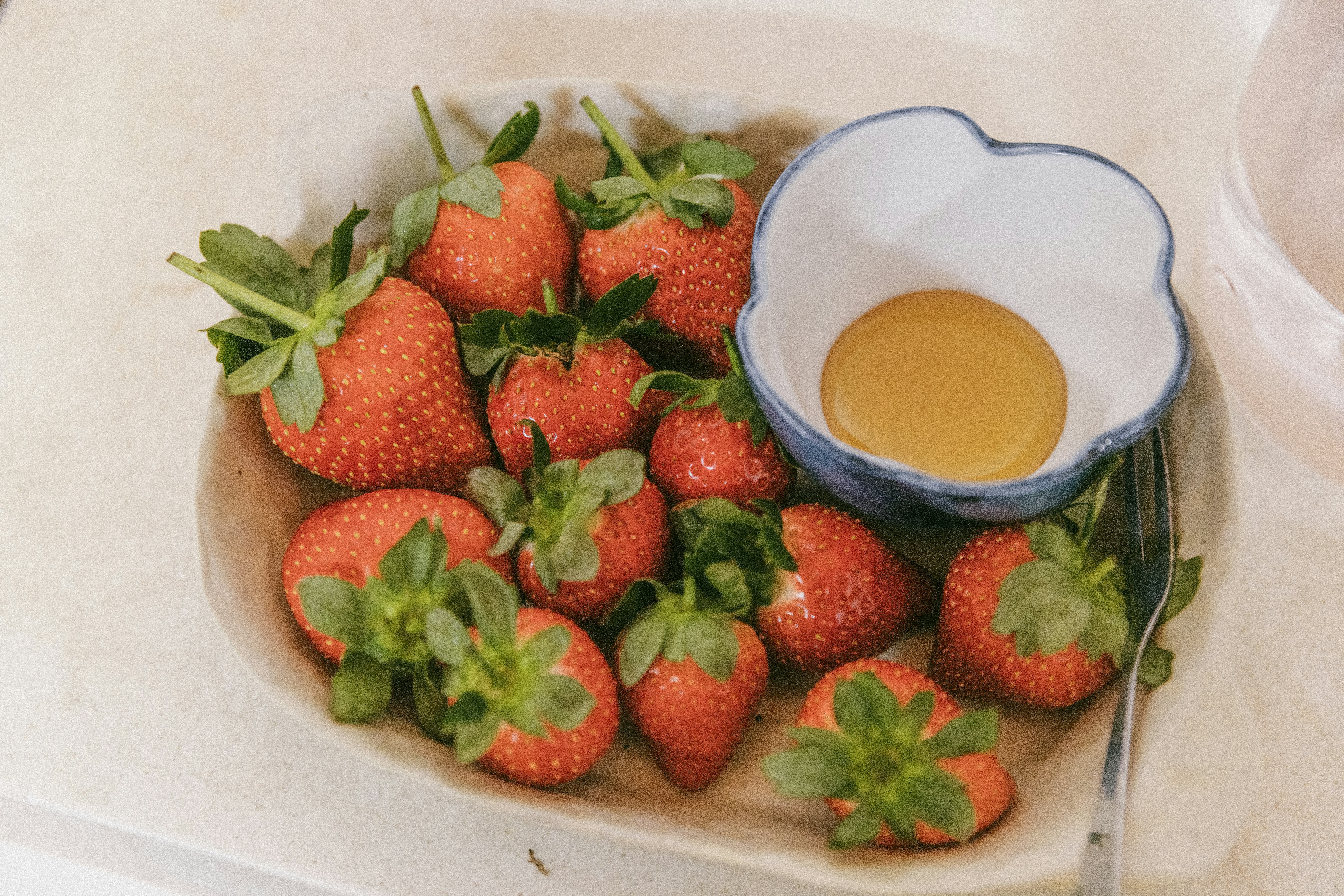 Sun-kissed Strawberries in a Creamy Basket