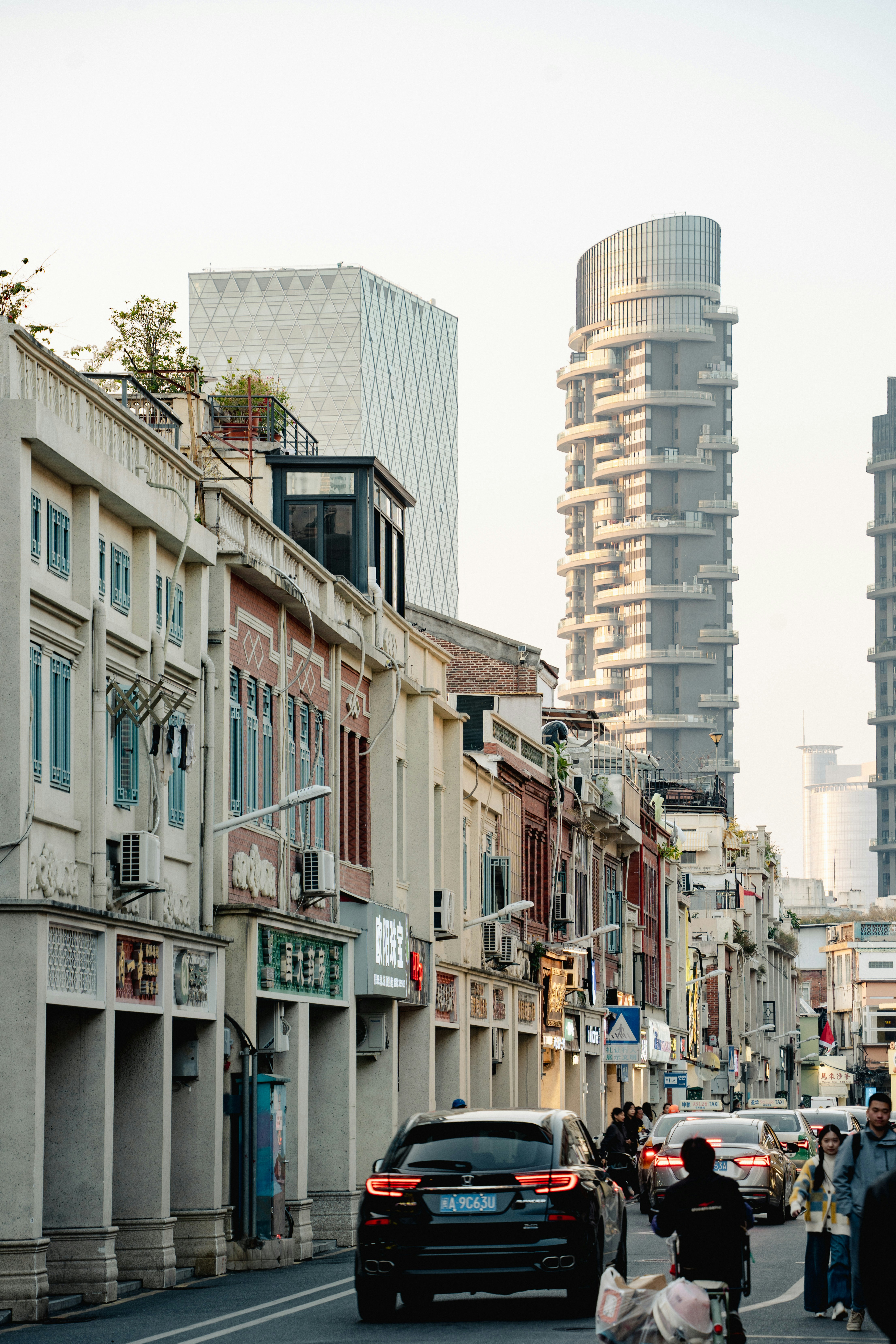 Urban Chorus: A Quiet Street Beneath Modern Giants