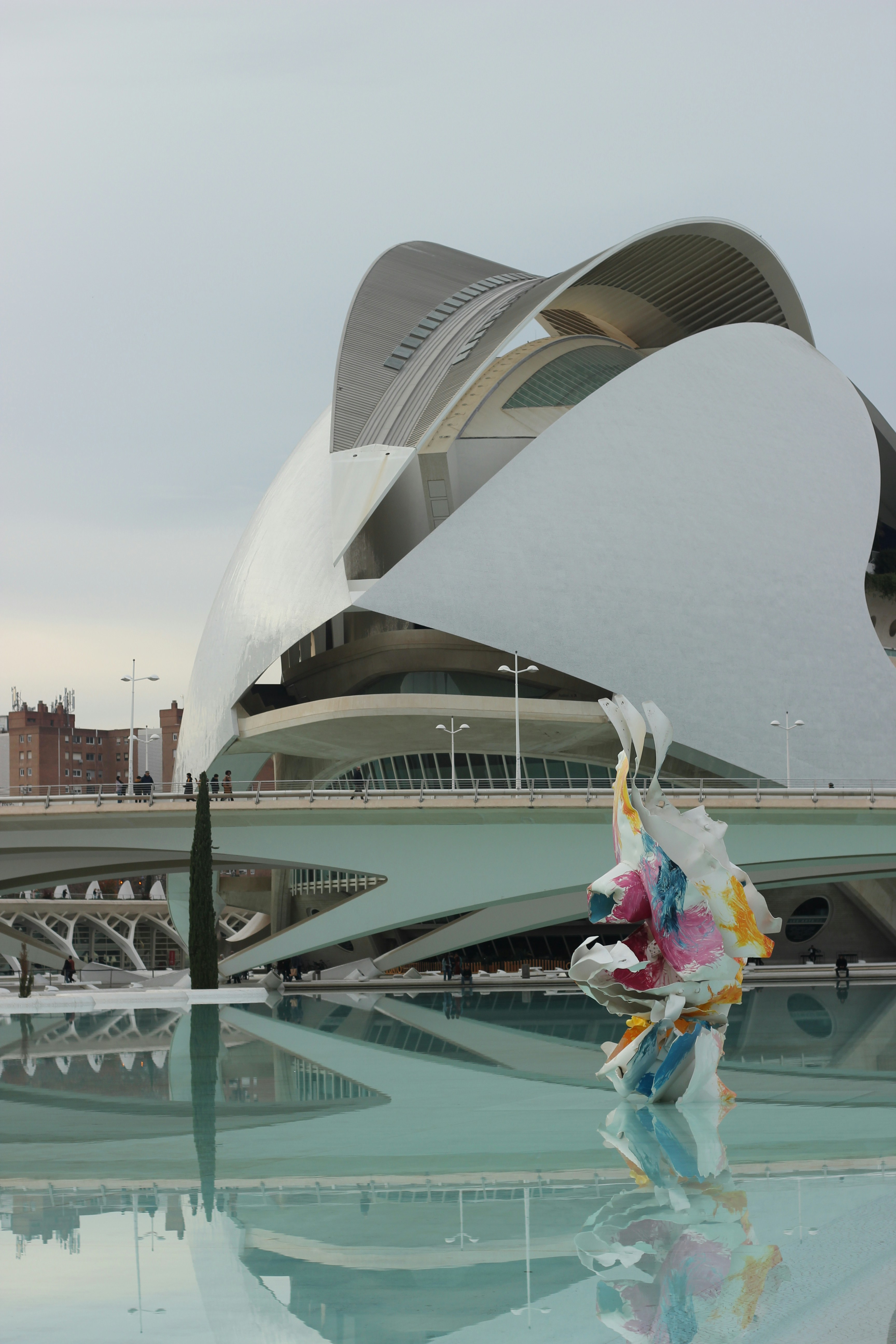 Fluid sculpture: the bridge and sculpture mirrored in a lagoon