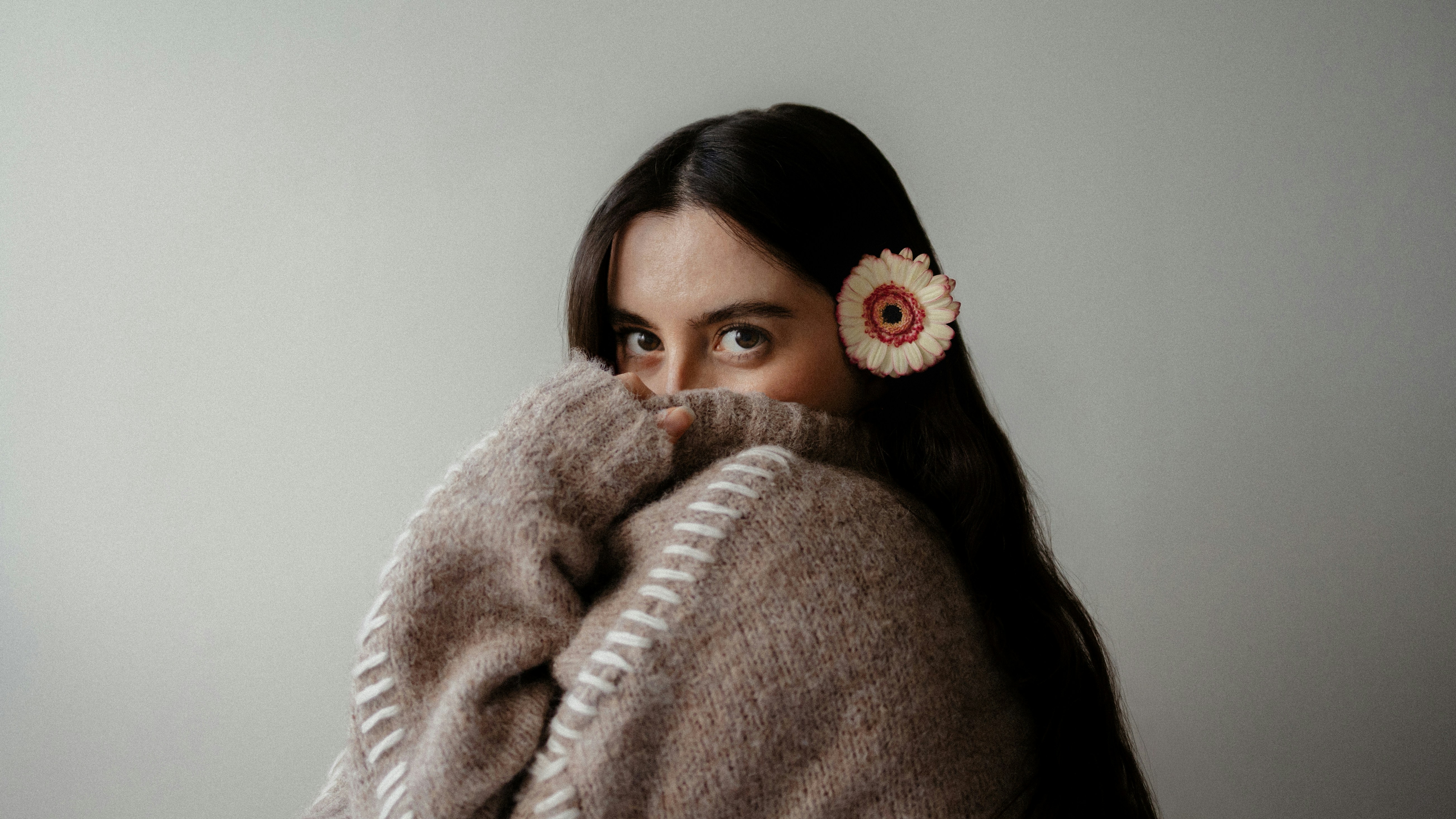 Gentle Mystery: A Portrait Wrapped in Warm Wool