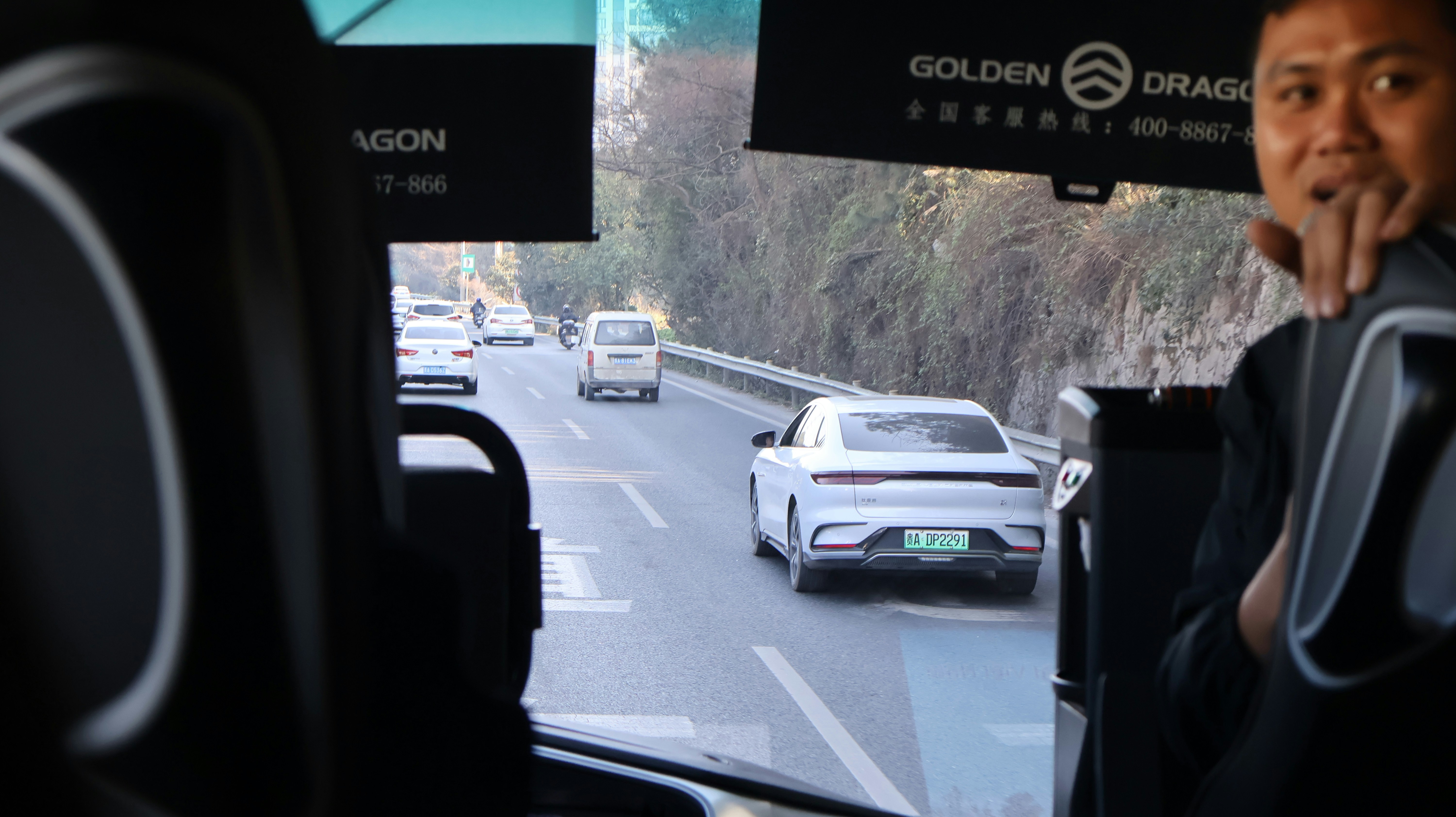 Onboard Perspective: The Bus Whizzes Past on a Far Narrow Highway