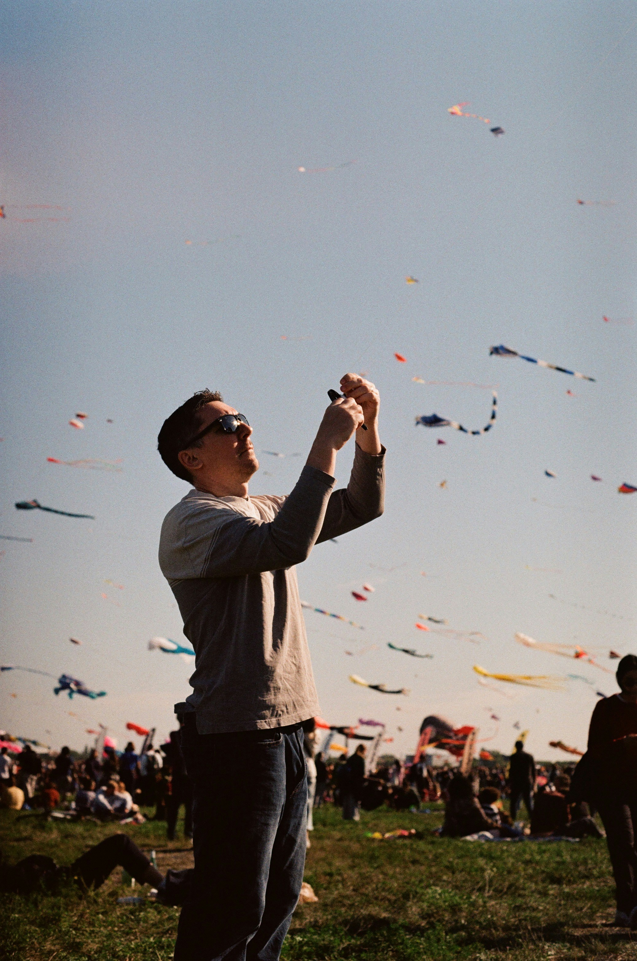 Man flying a kite at an outdoor festival photo – Free Festival Image on ...