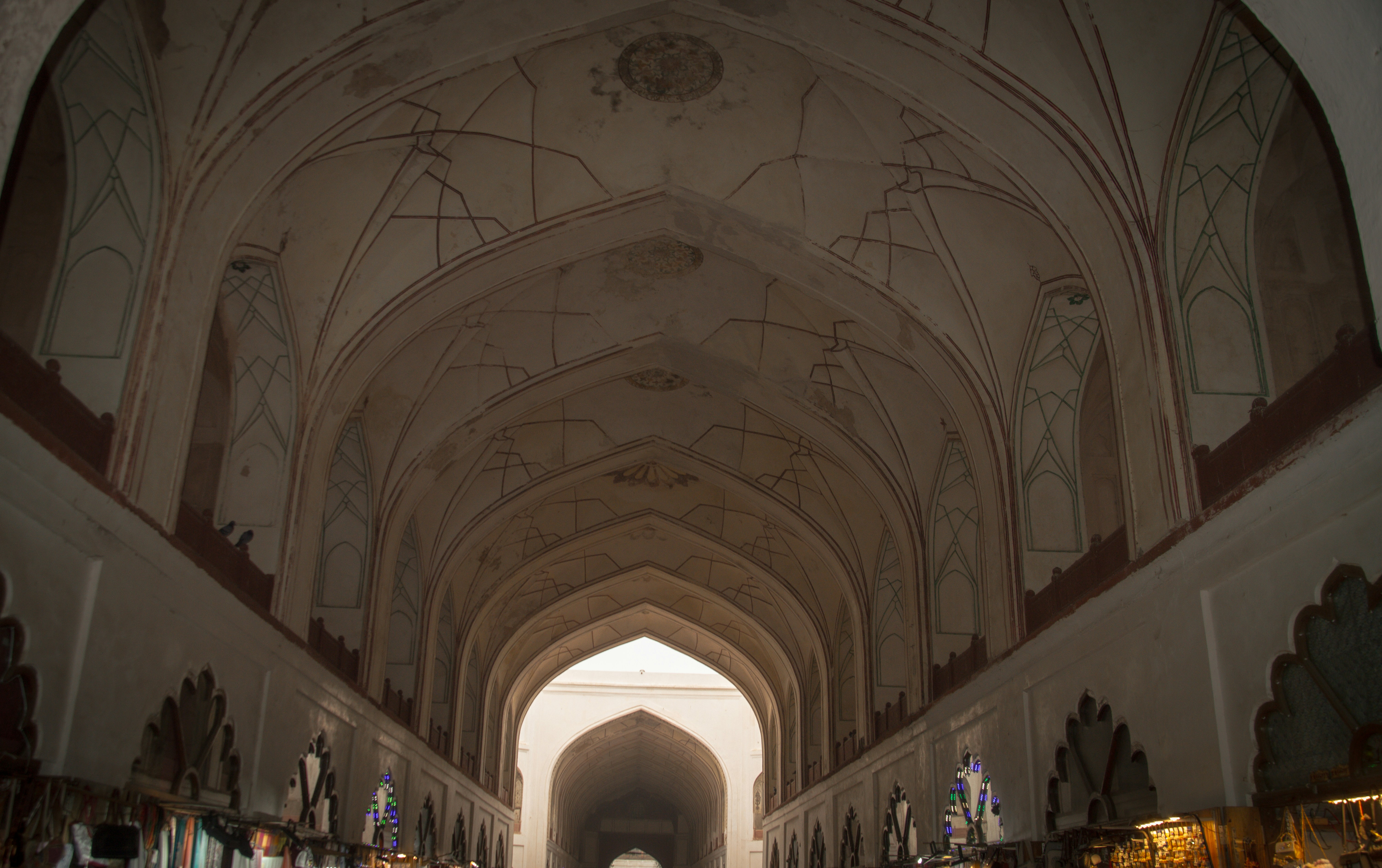Aisle of Echoes: Gothic Vaults Converge at the Lanterned Arch