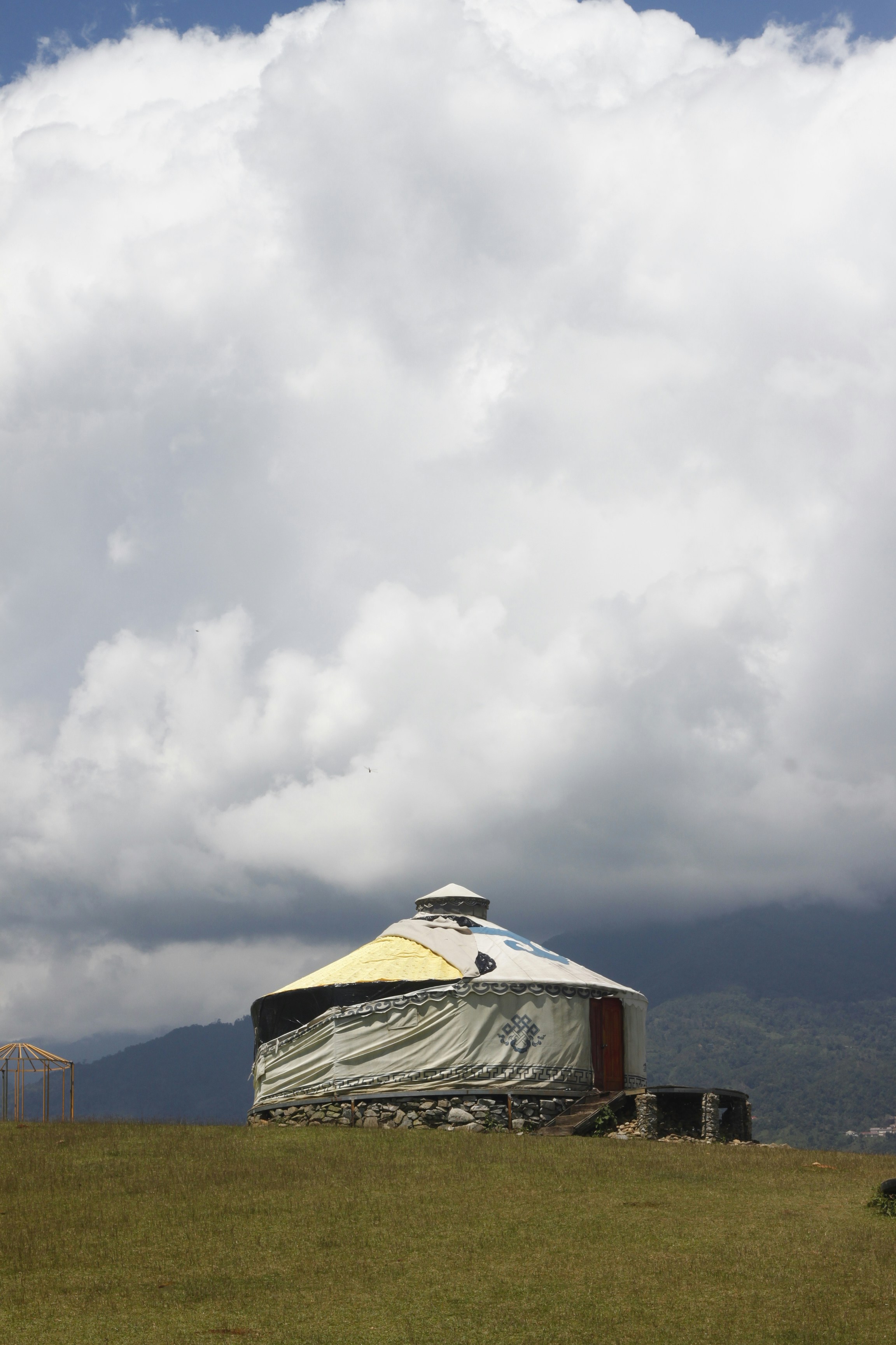 Atlantic Yurt Under a Sky Crowned with Clouds