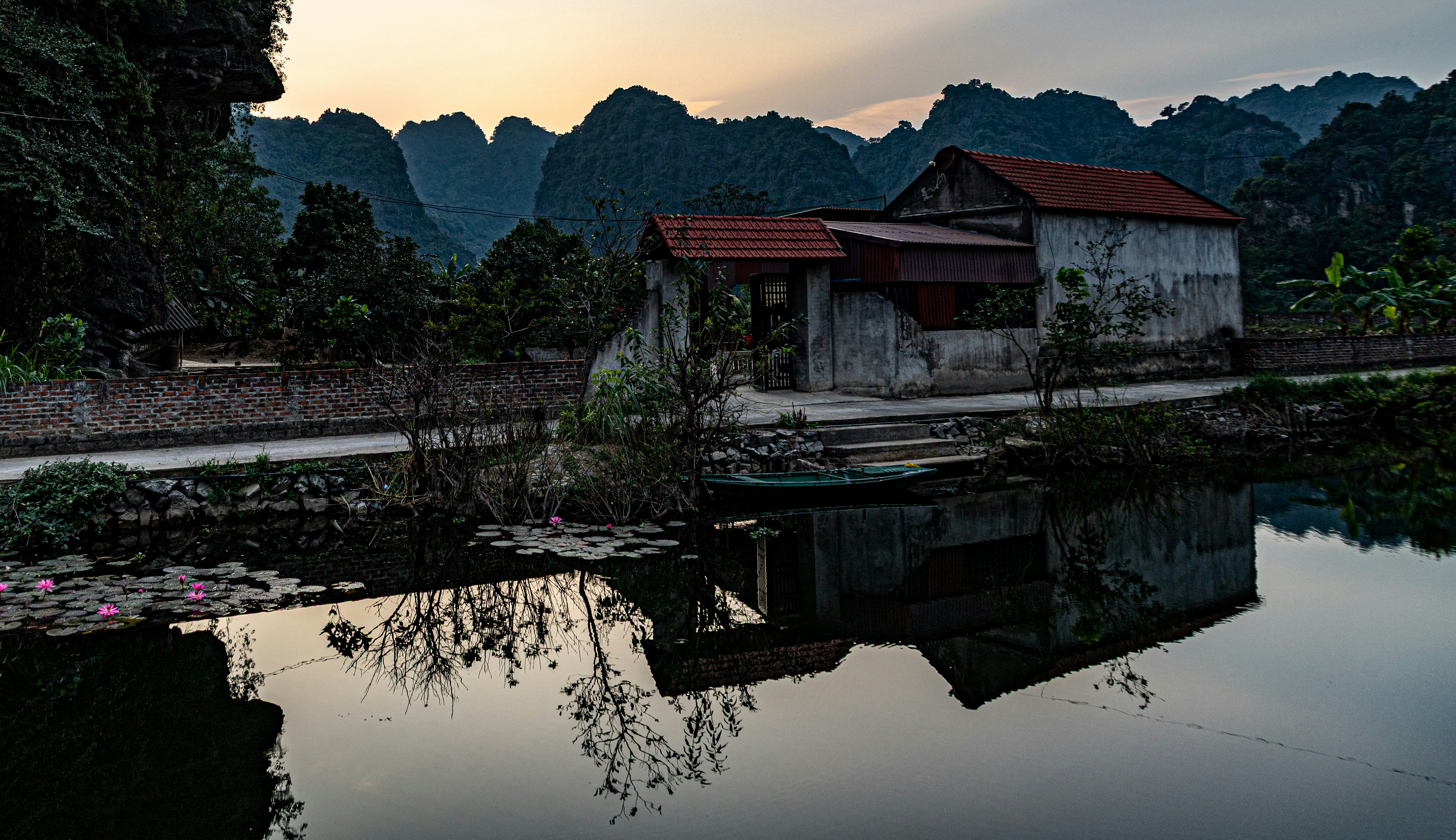Moonlit House Over Quiet Water