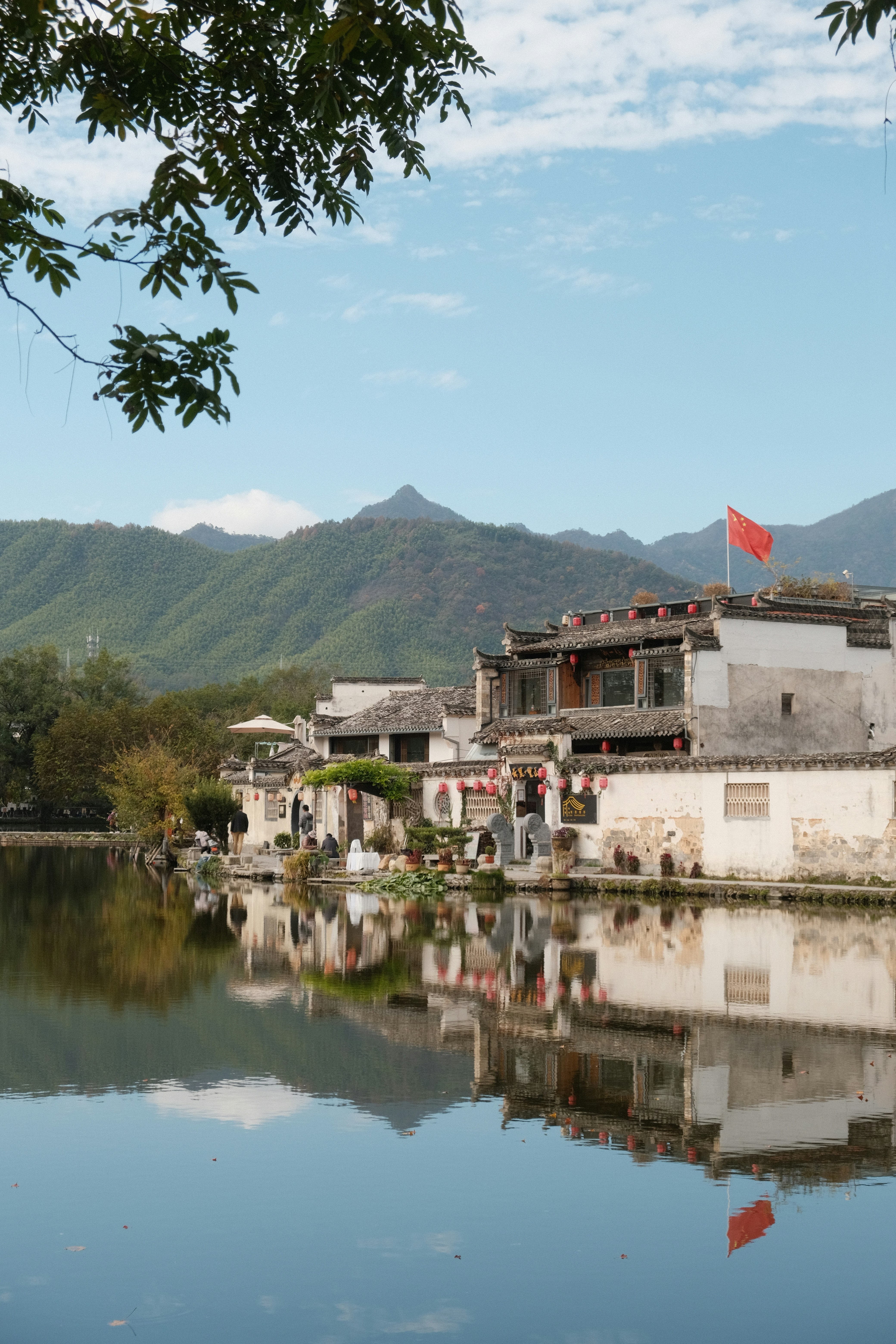 Quiet Waterside Village Under a Chinese Flag