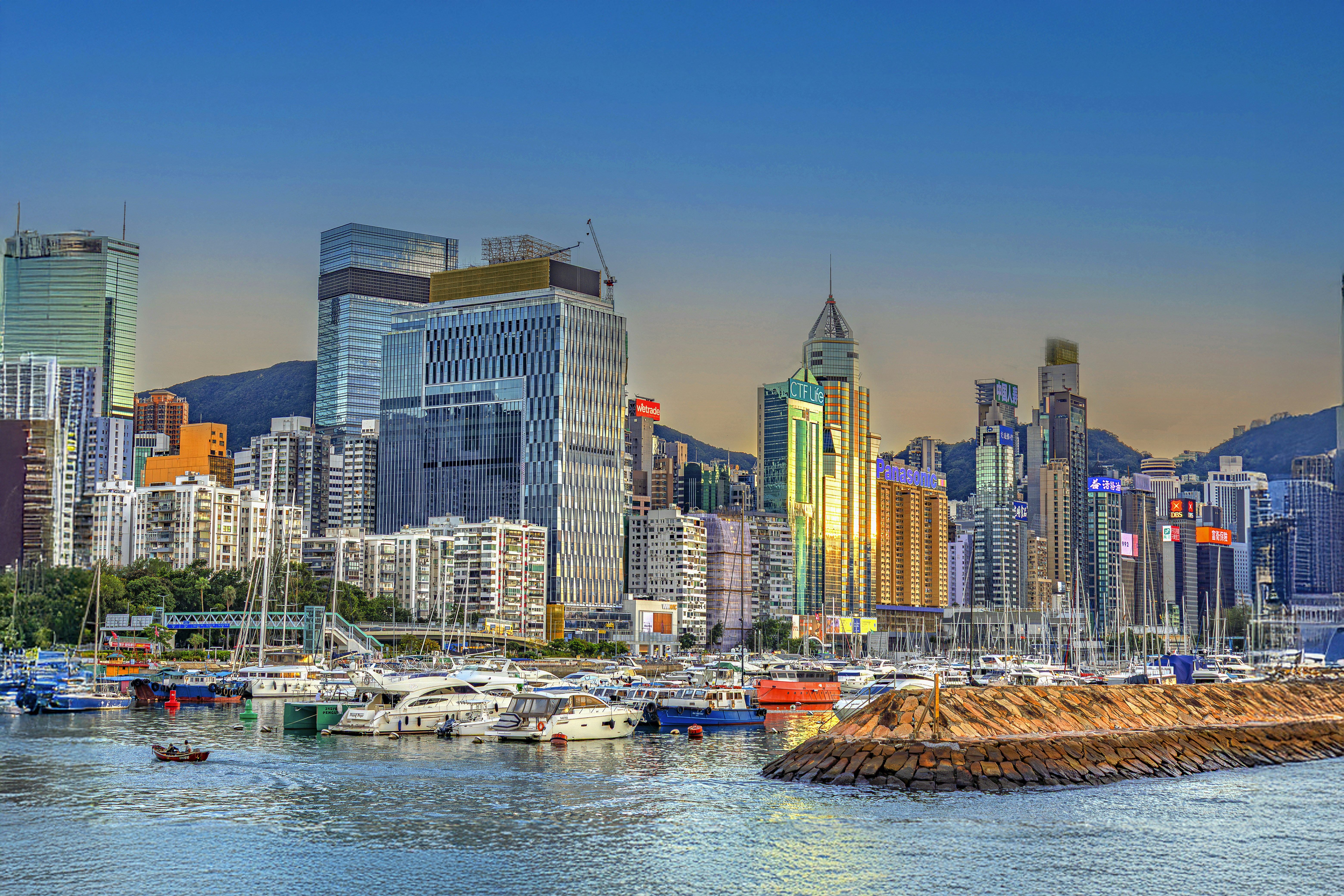 Harbor Skyline Echo: Docks, Boats, and Towering Glass