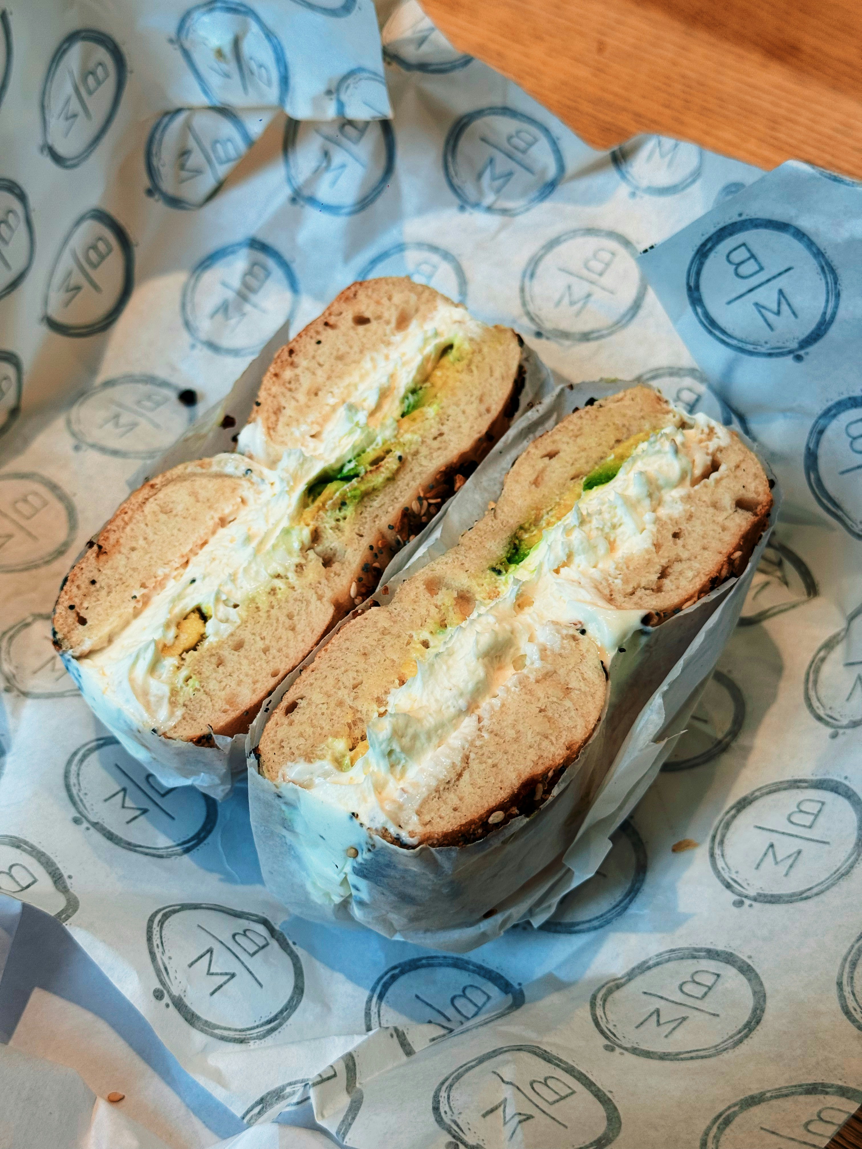 Creamy Sandwich Cut in a Folded Circle of Branding Paper