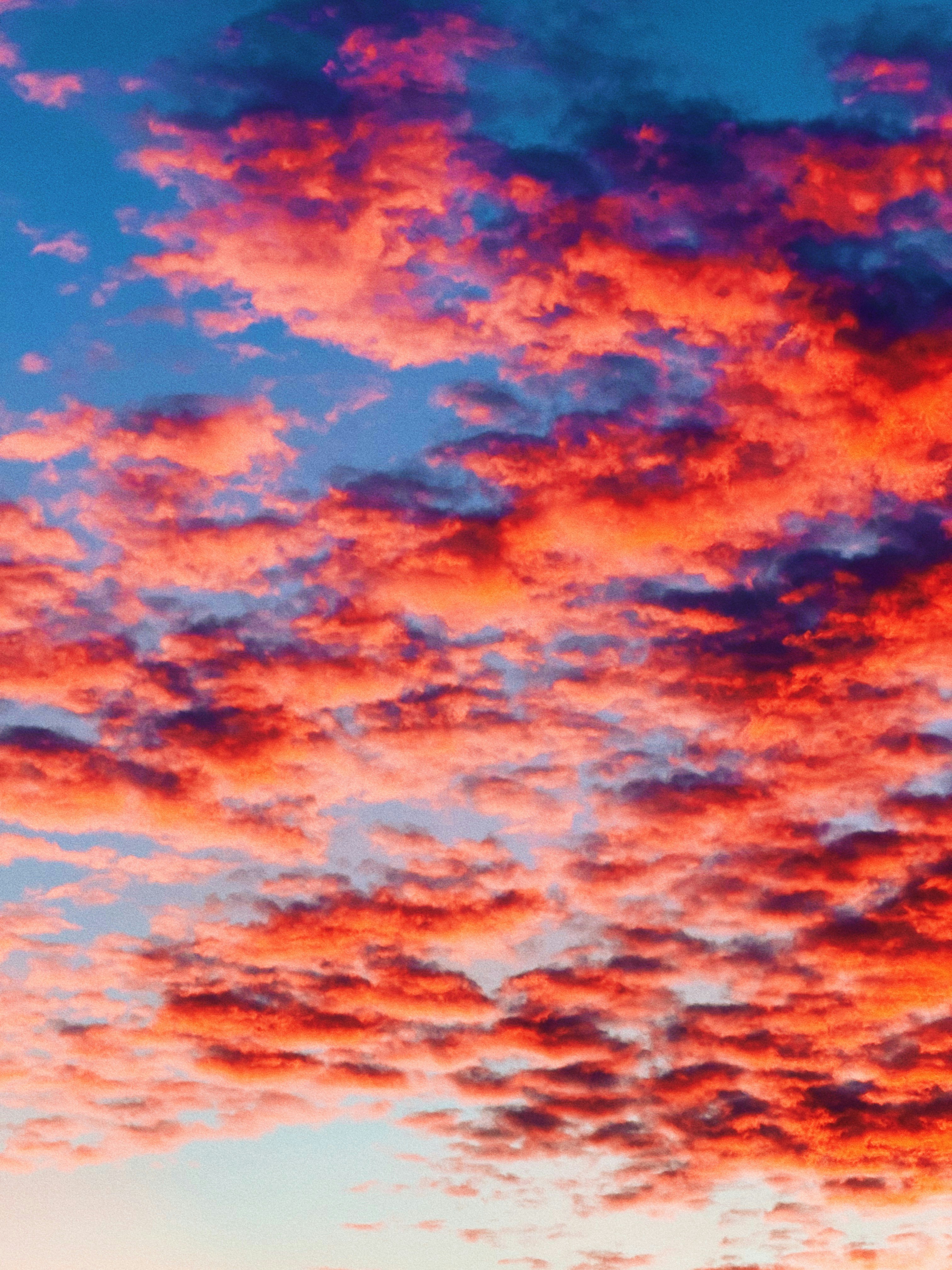 Crimson Clouds at Sunset: A Sky Painted in Fire