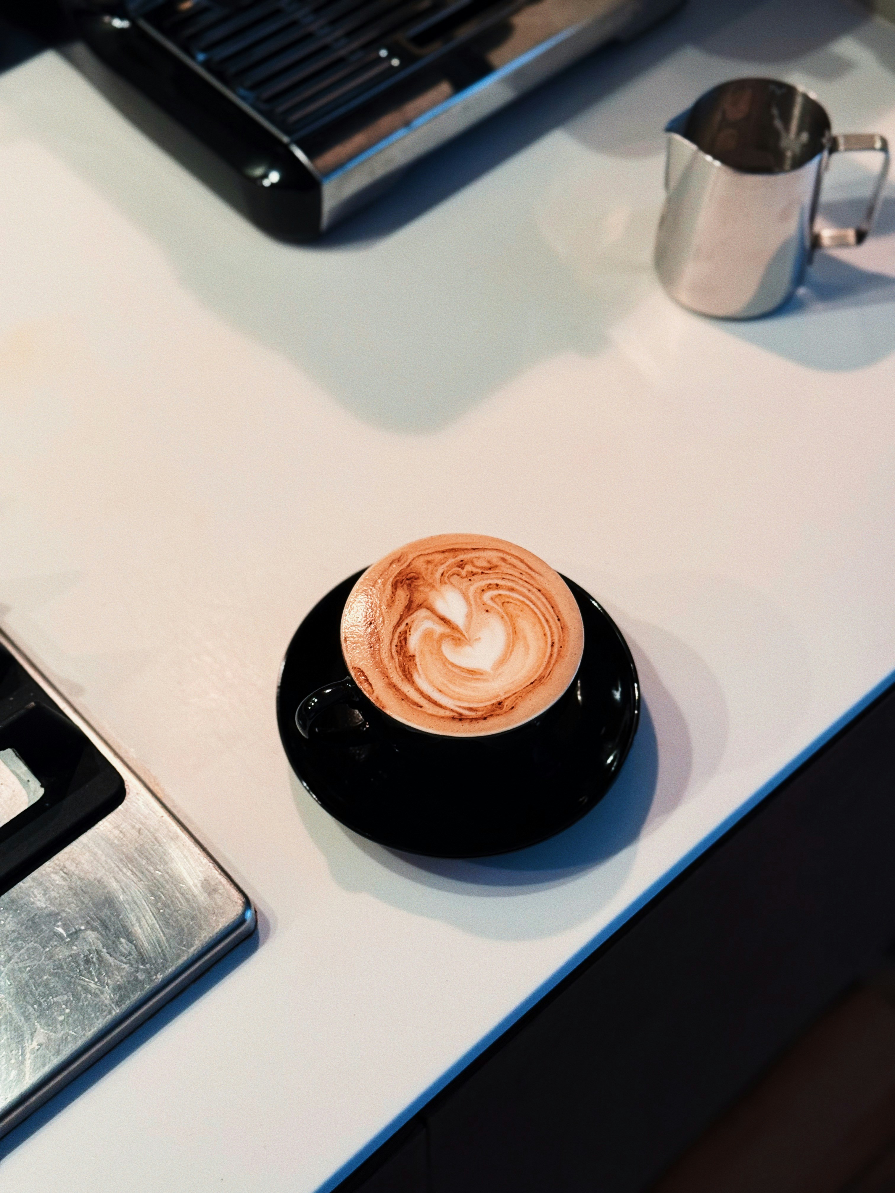 A Quiet Moment at the Coffee Bar: Latte Art on a Marble Counter