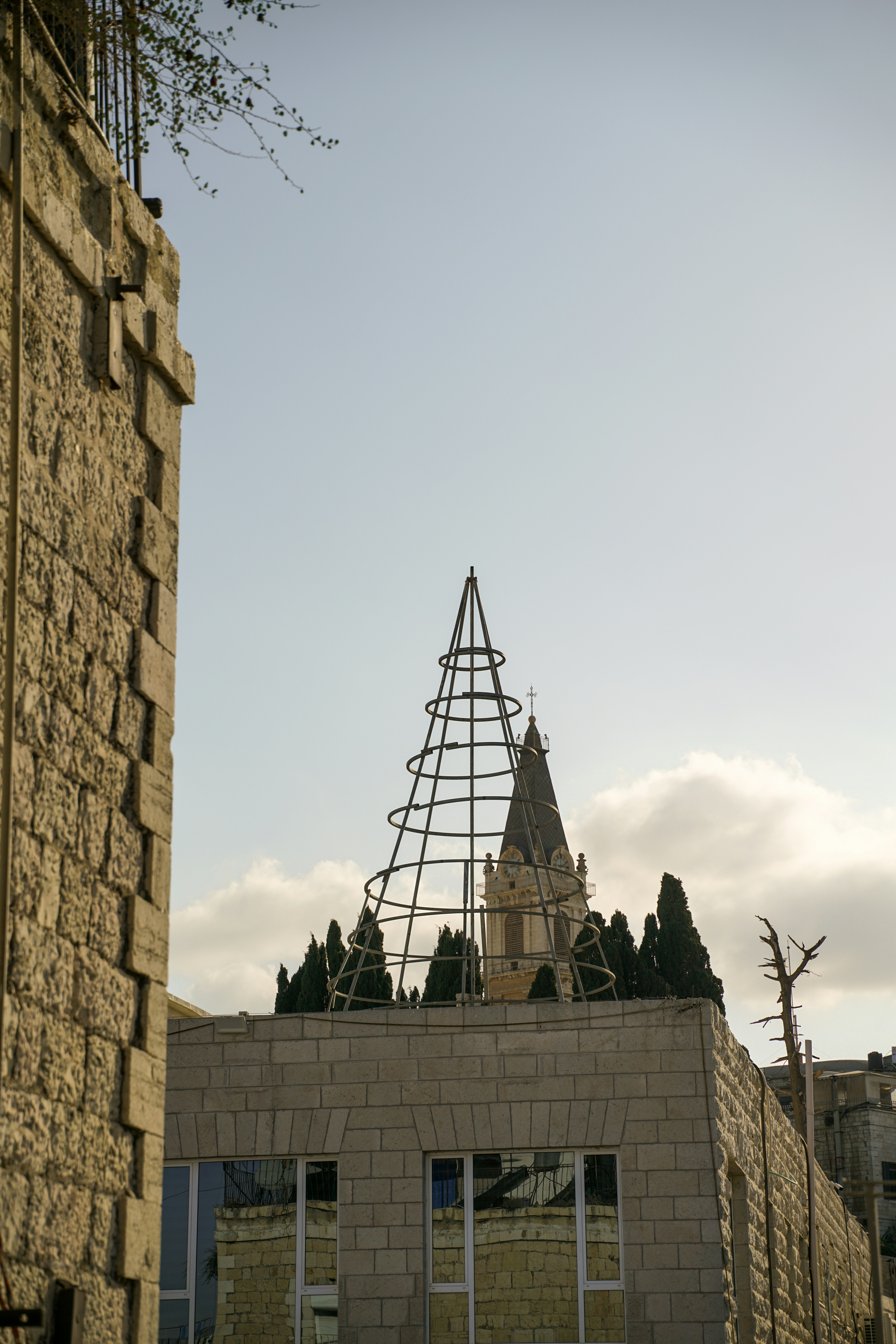 Architectural Cone: A Stone Facade Framed by Sky