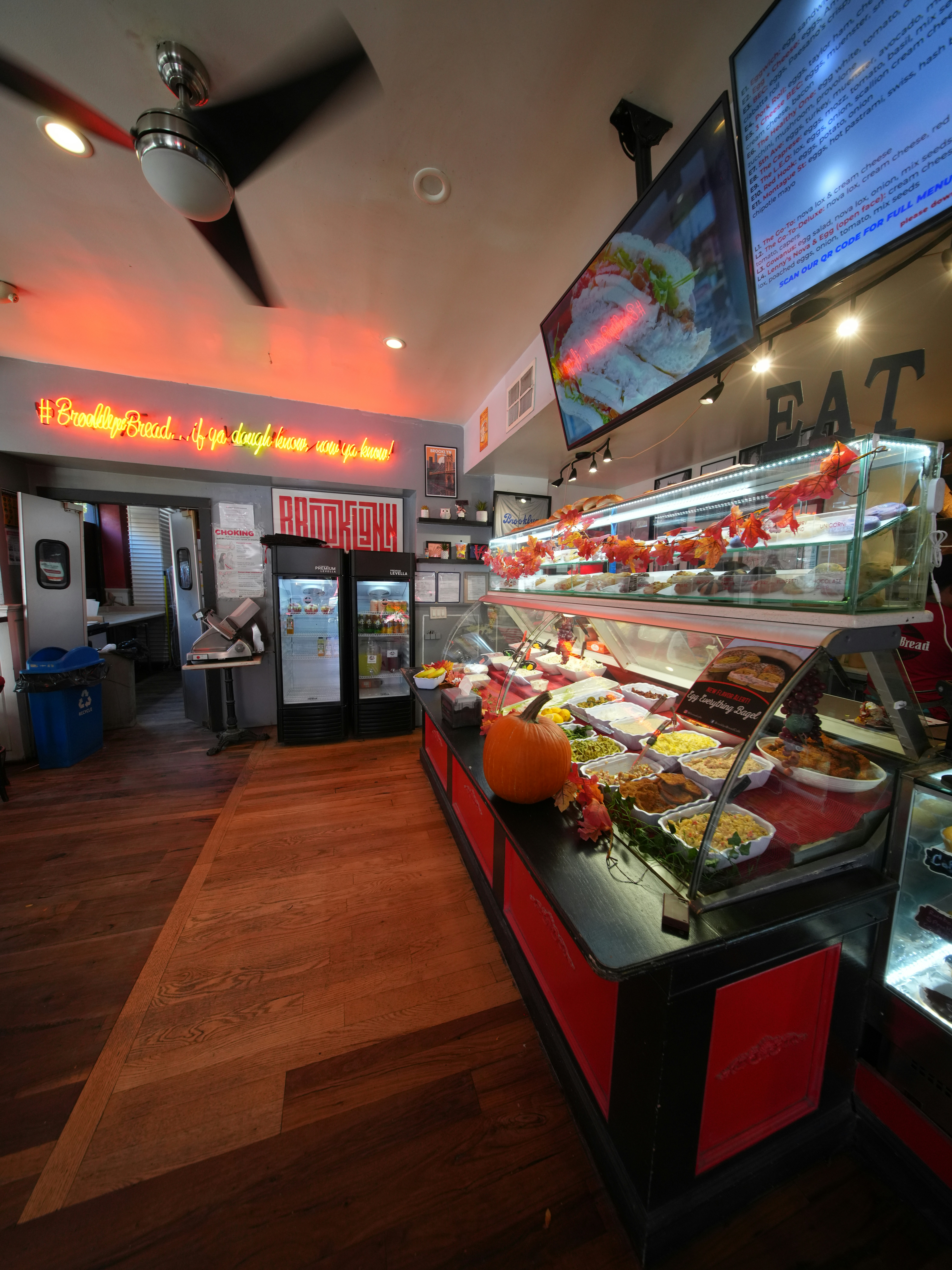 Neon Diner Glow: A Fruit-Topped Display in a Cozy Eatery