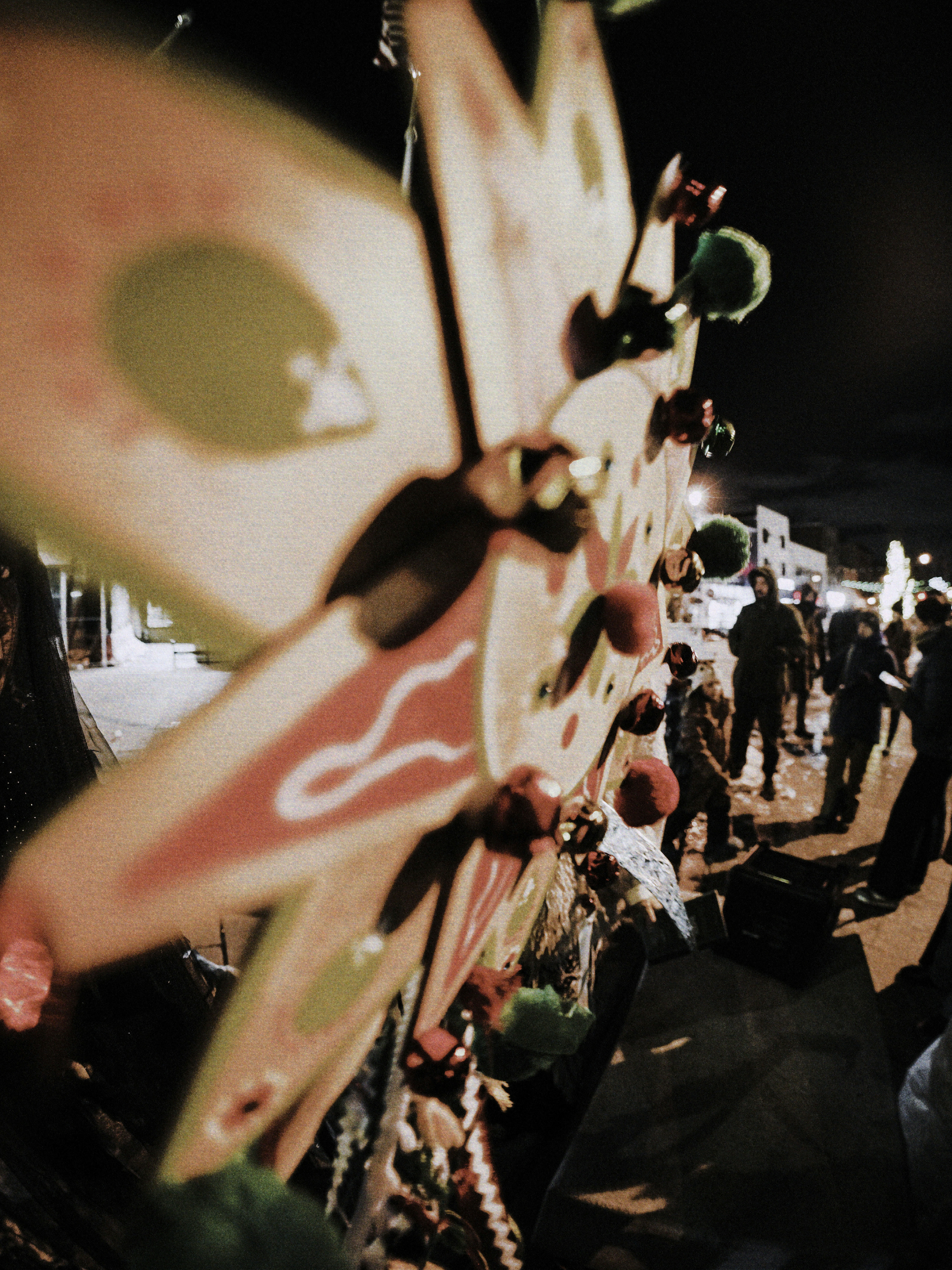 Carnival Wheel of Color: A Night Parade Along the Tilted Boardwalk