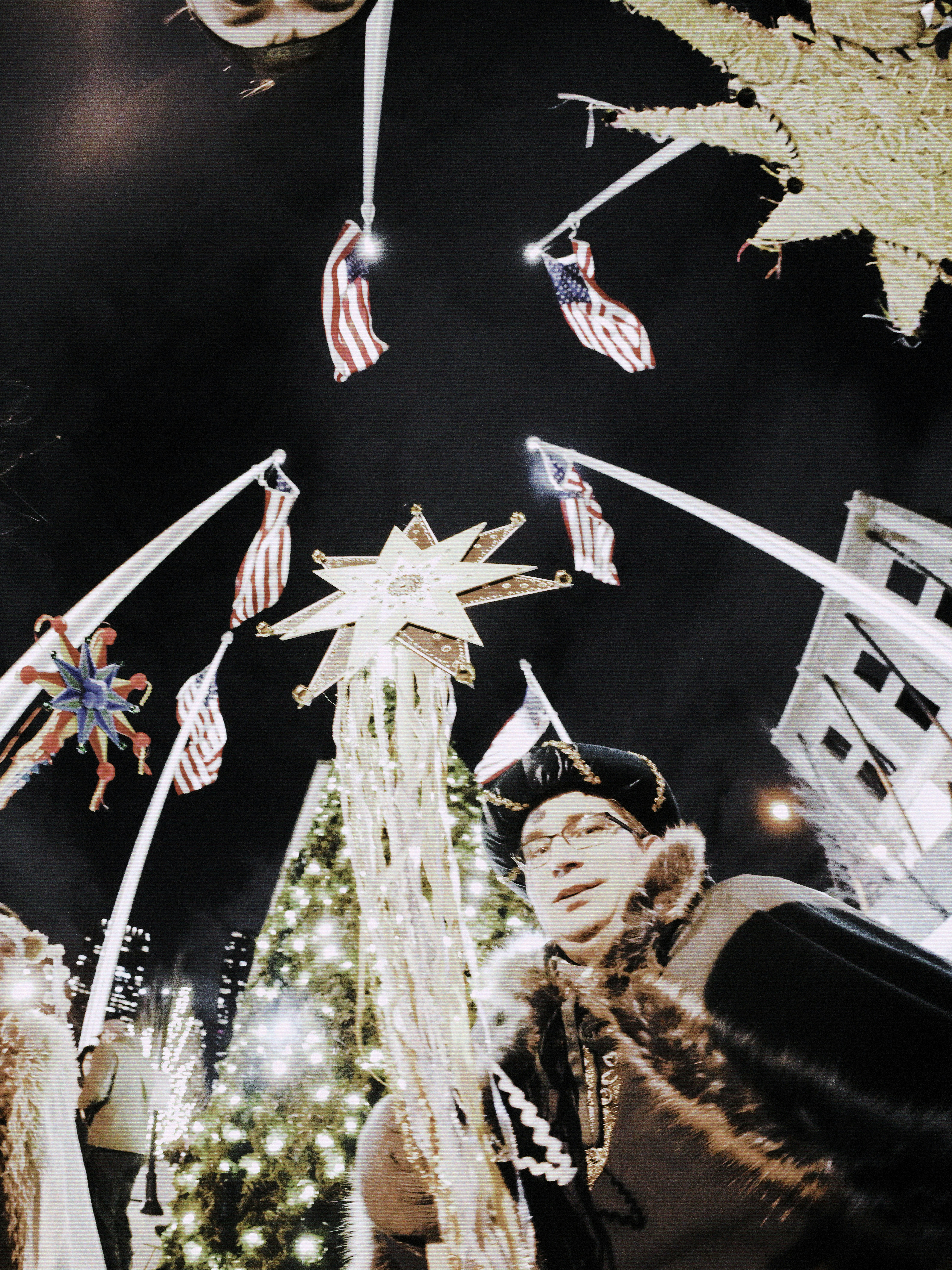 Night Parade: Star Lanterns and American Flags under City Lights