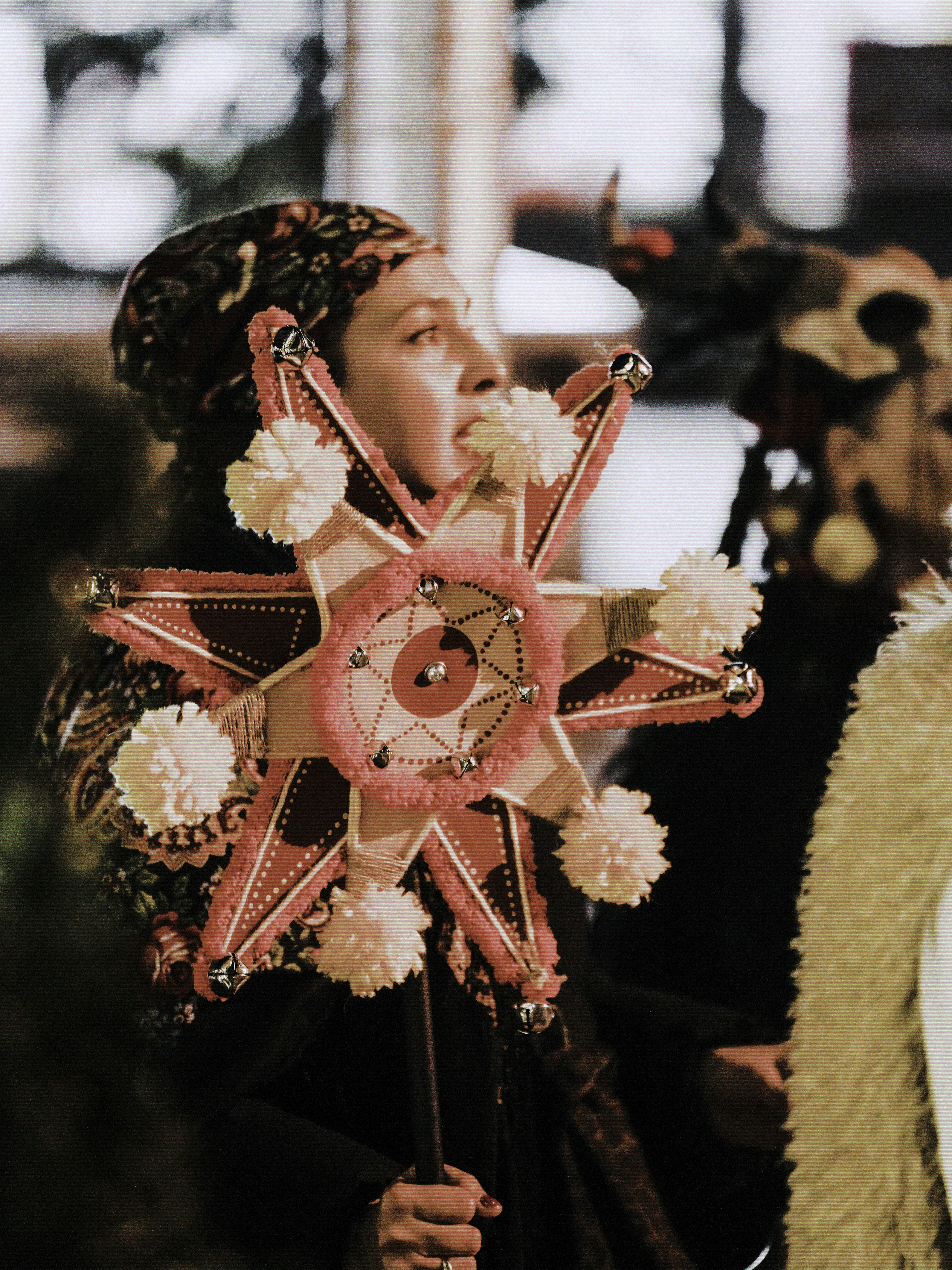 Star-Shaped Mask and Silent Watcher in a Festive Night