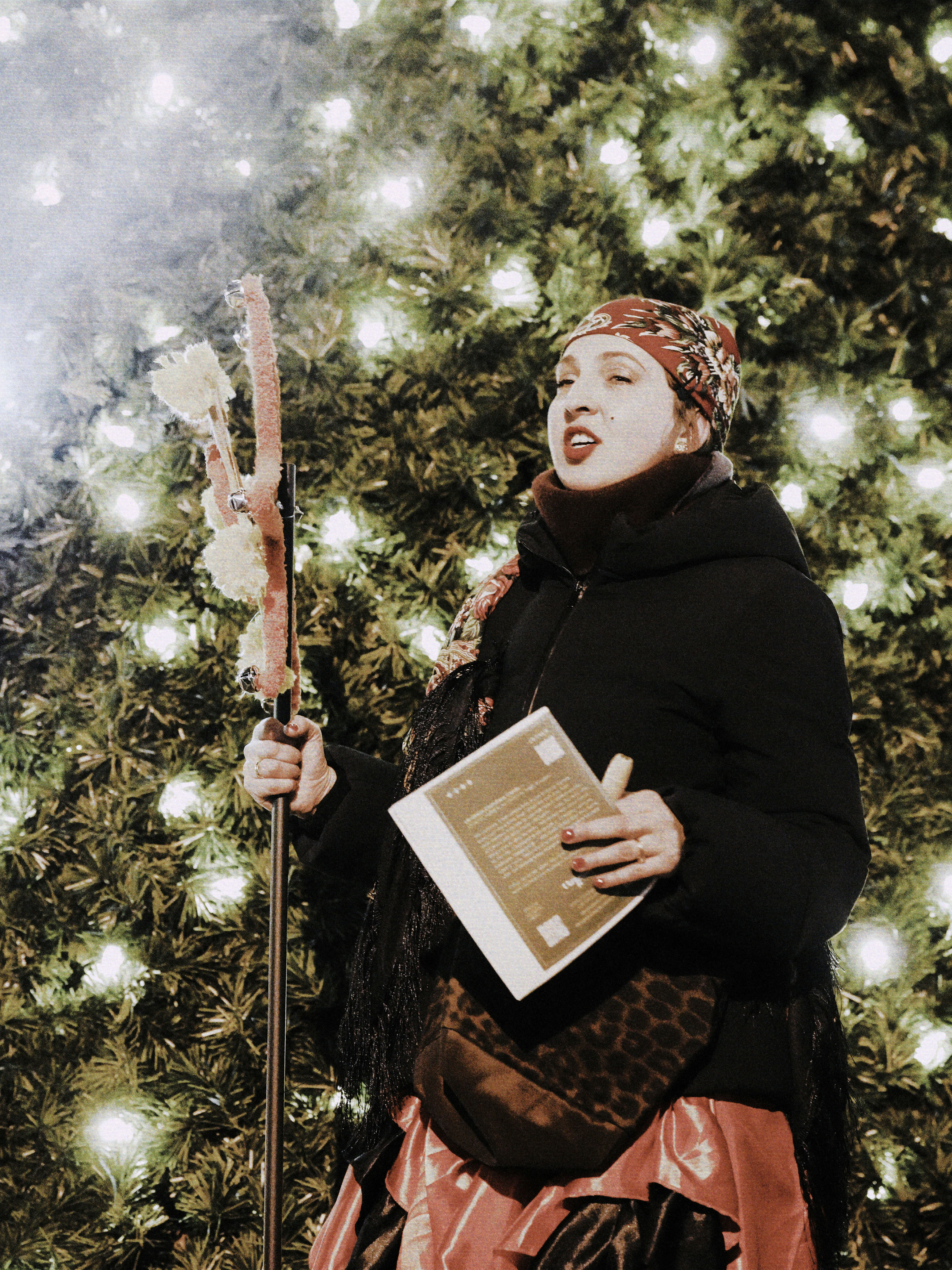 Festive Spotlight: A Weathered Singer Under Guiding Lights