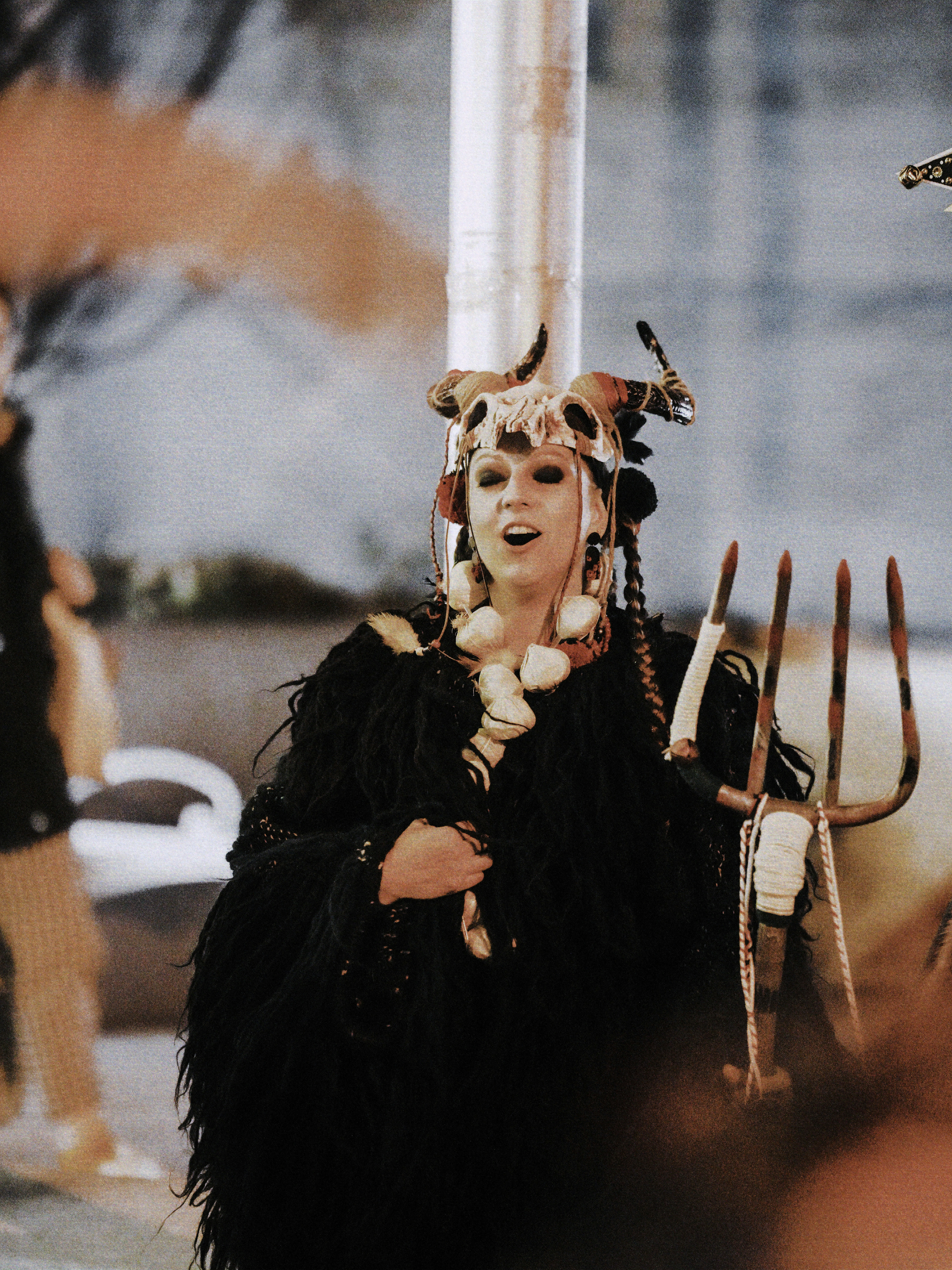 Ceremonial Conductor in Feathered Regalia