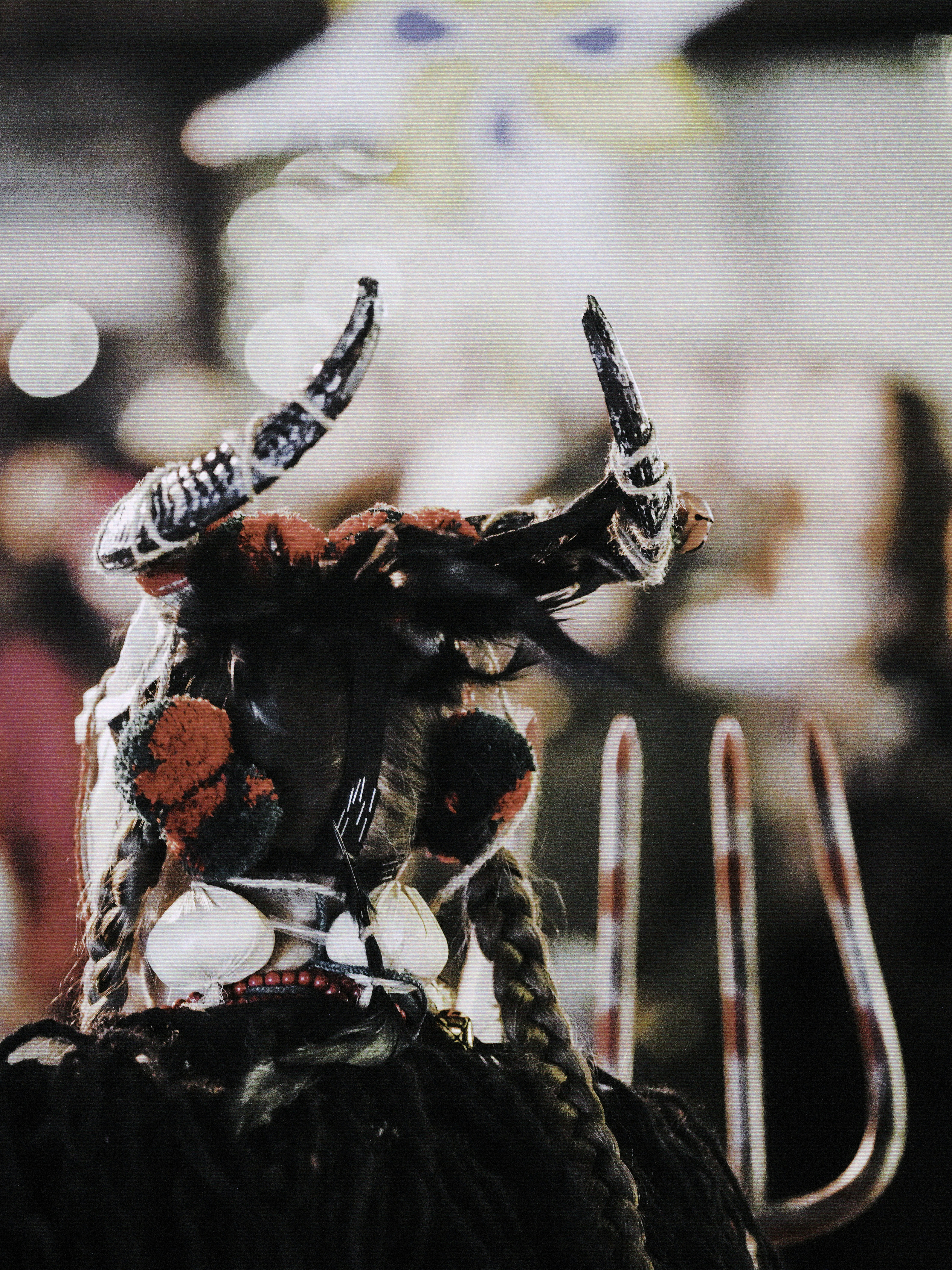 Headpiece of Red Pom-Pom Rituals: A Silent Ceremony