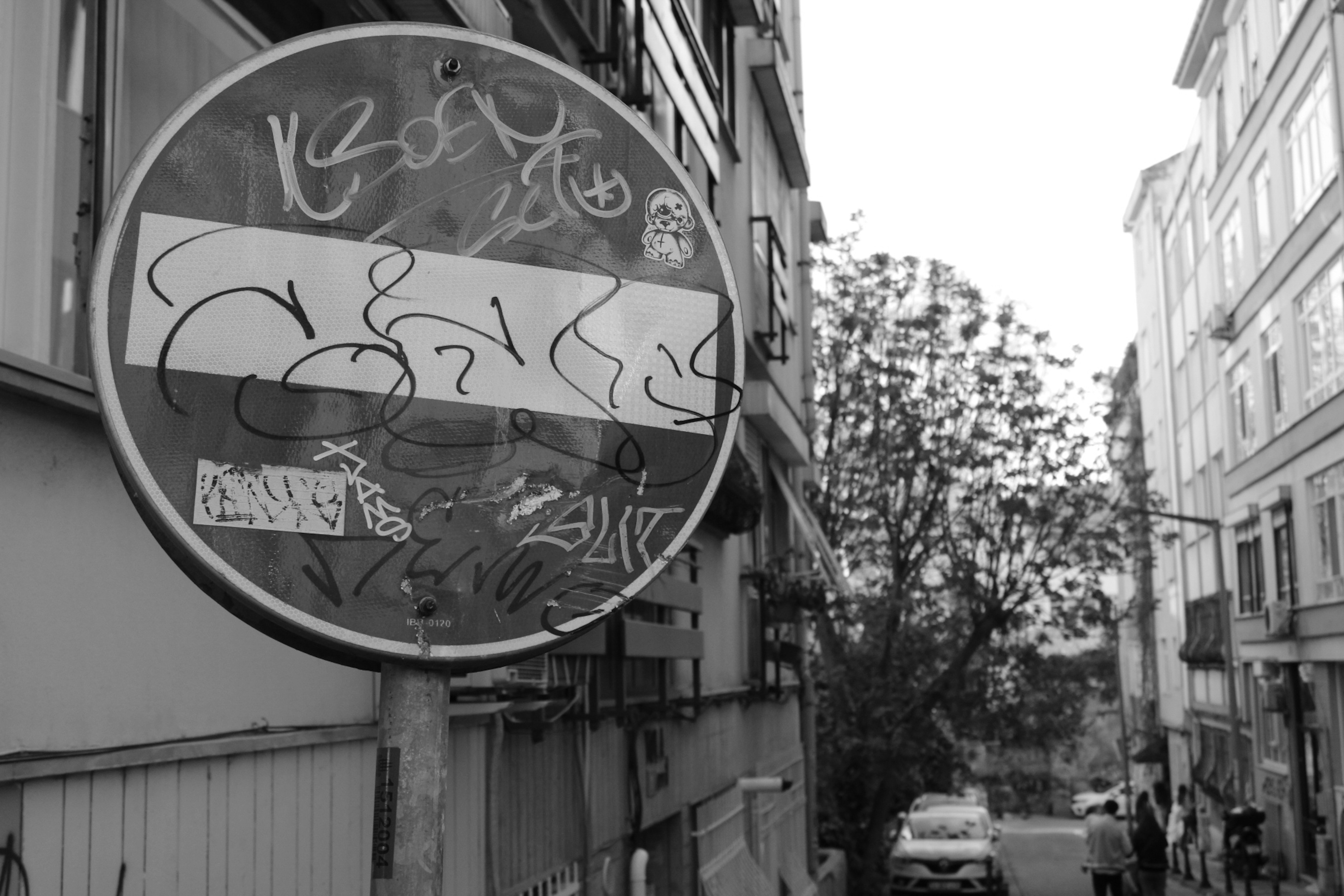Graffiti Circle in a Narrow Urban Street