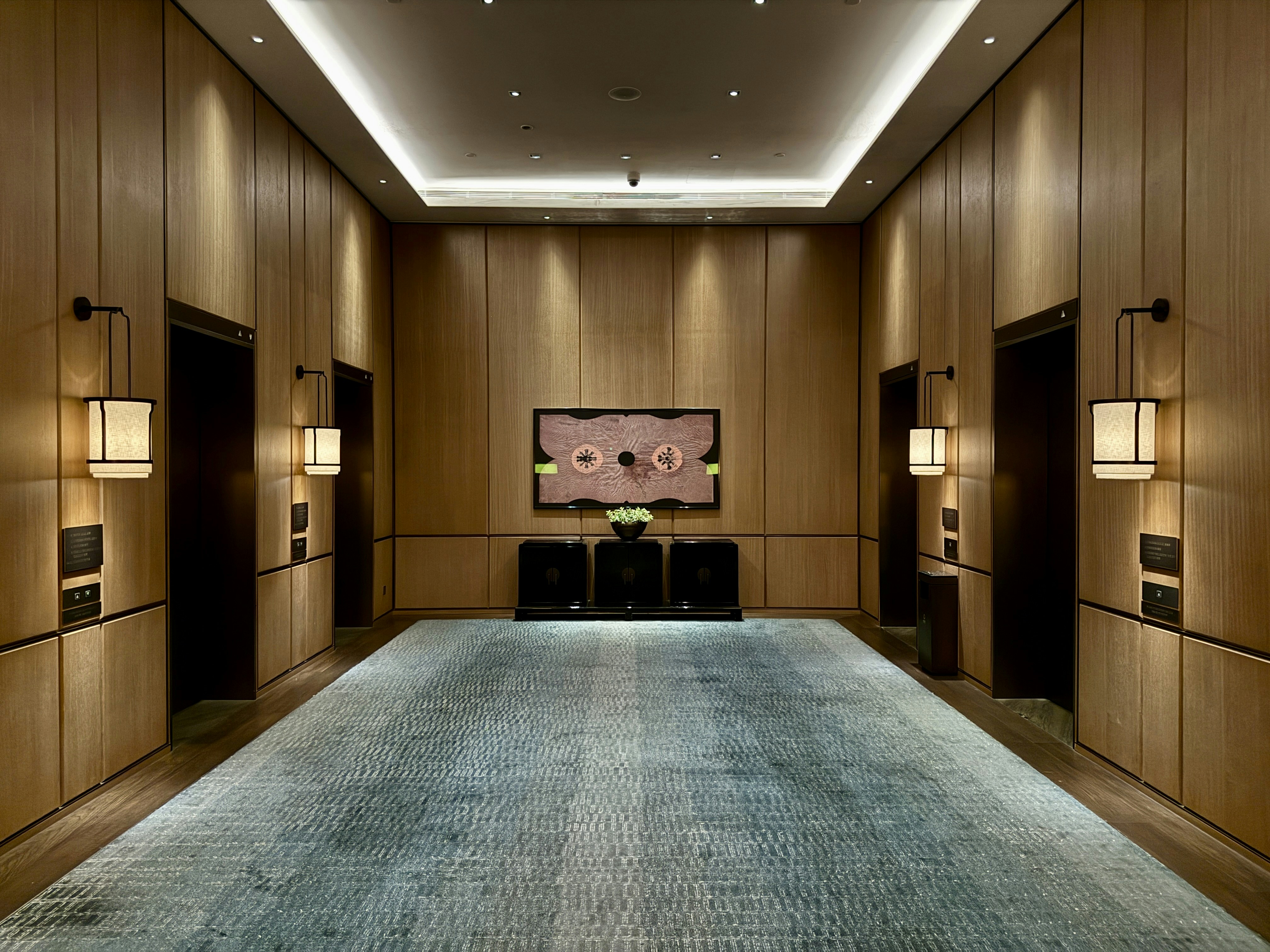 Modern hotel lobby with elevator doors and artwork photo – Free ...