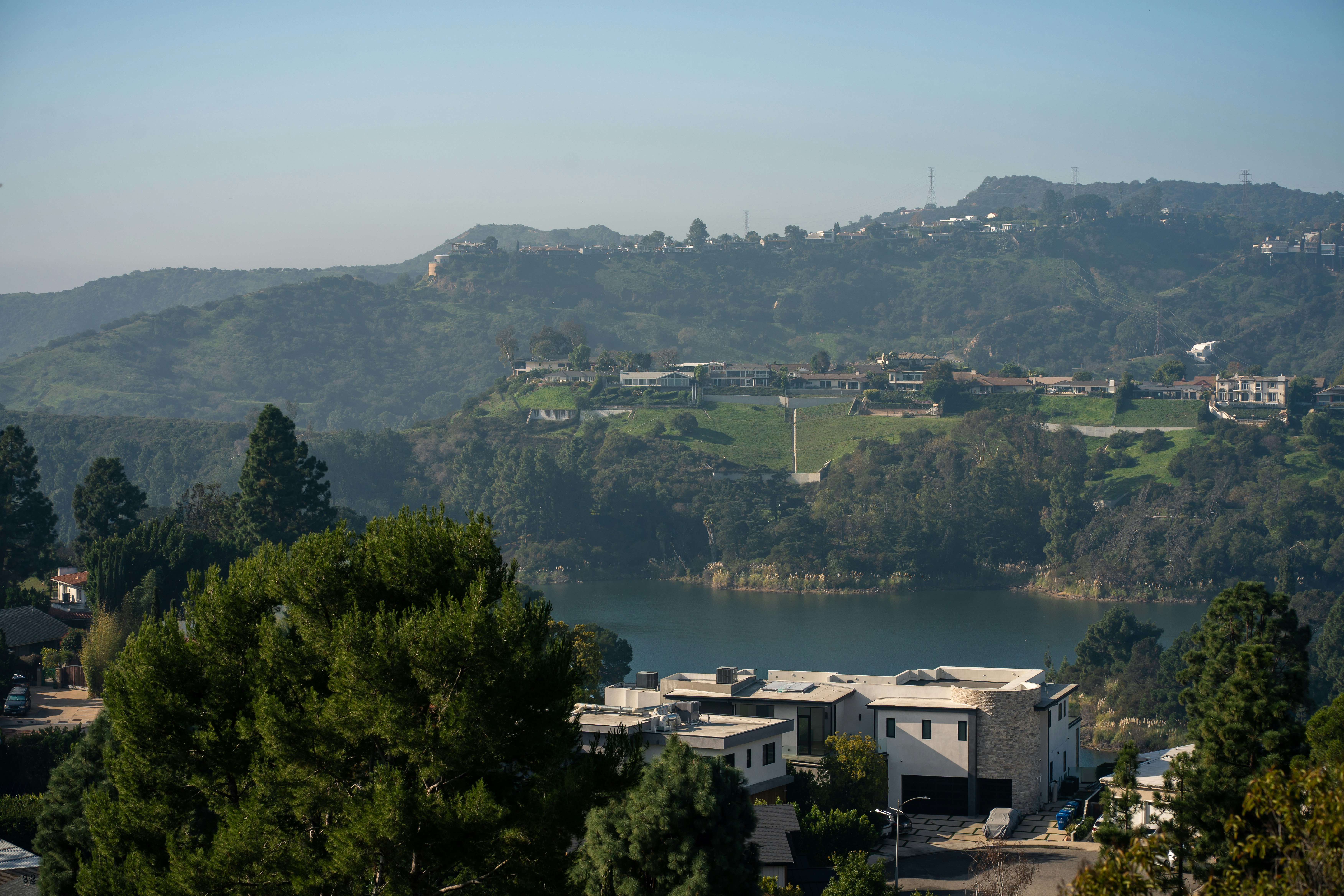 Lakefront Terrace: Suburban Hillside Overlooking Water and Distant Homes