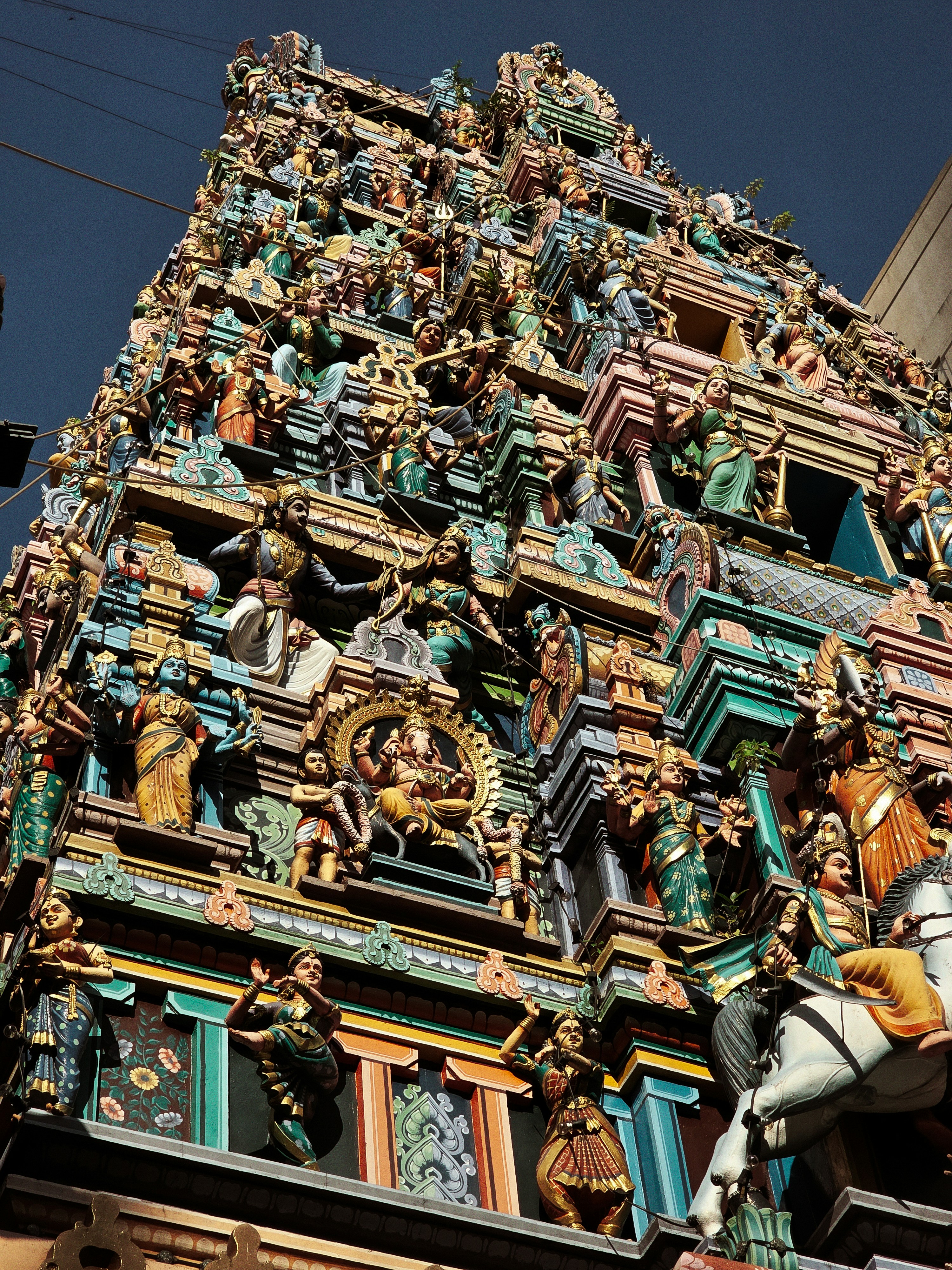 Ornate hindu temple tower with colorful sculptures photo – Free Temple ...