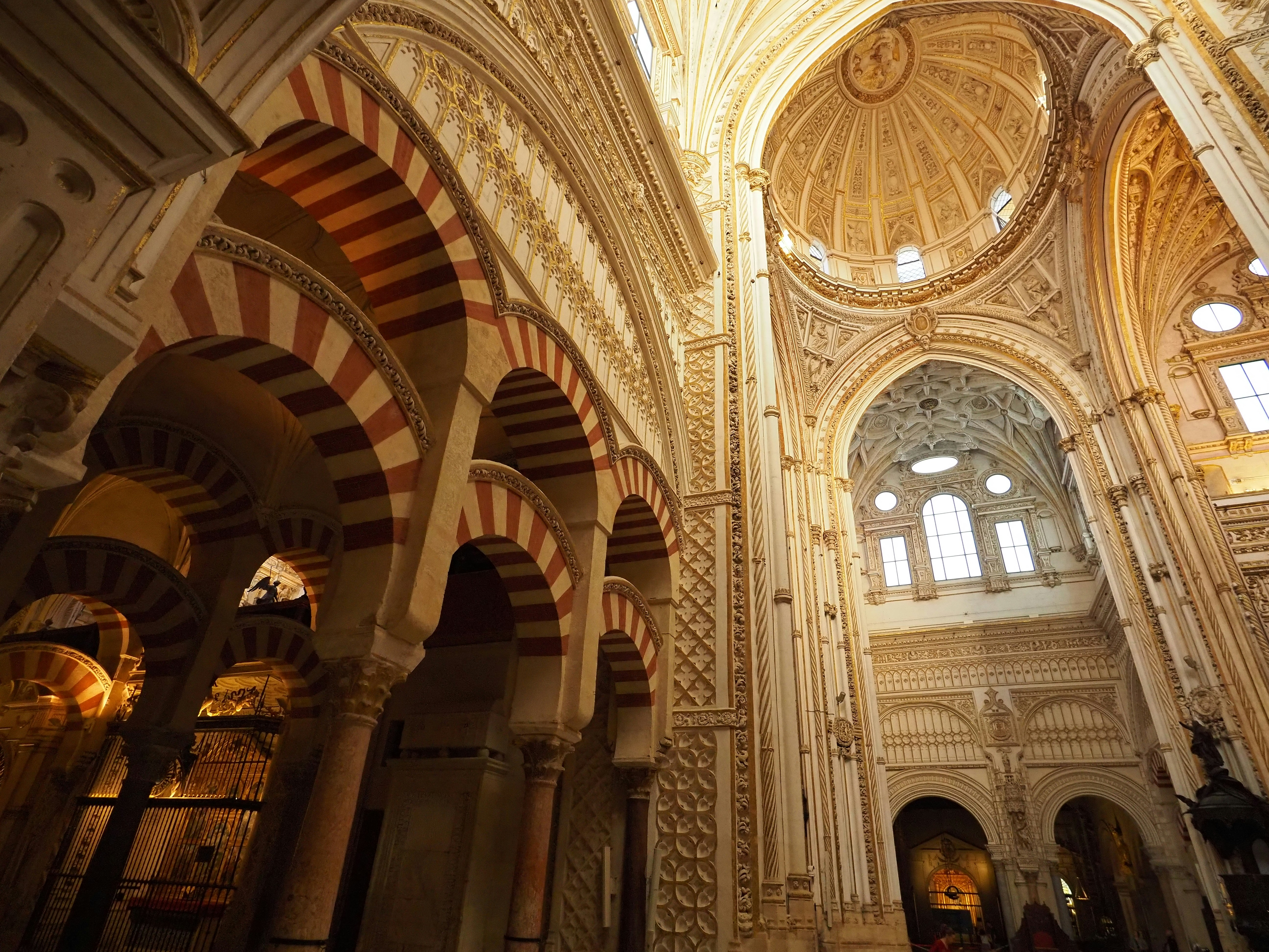 Arcade Shadows and Sunlit Domes: A Moorish Interior in Warm Light