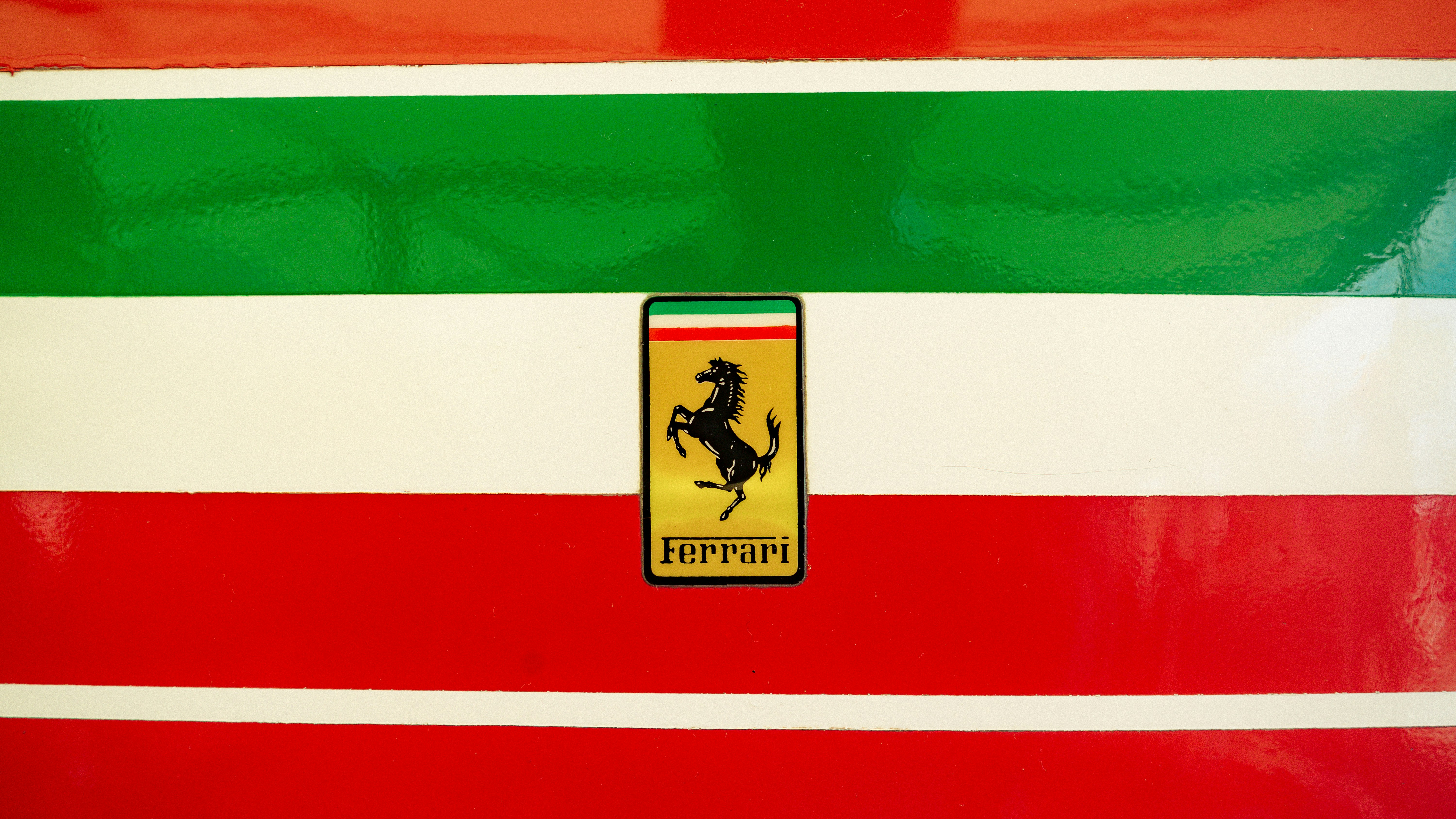 Prancing Horse Emblem Centered on Bold Green-White-Red Stripes