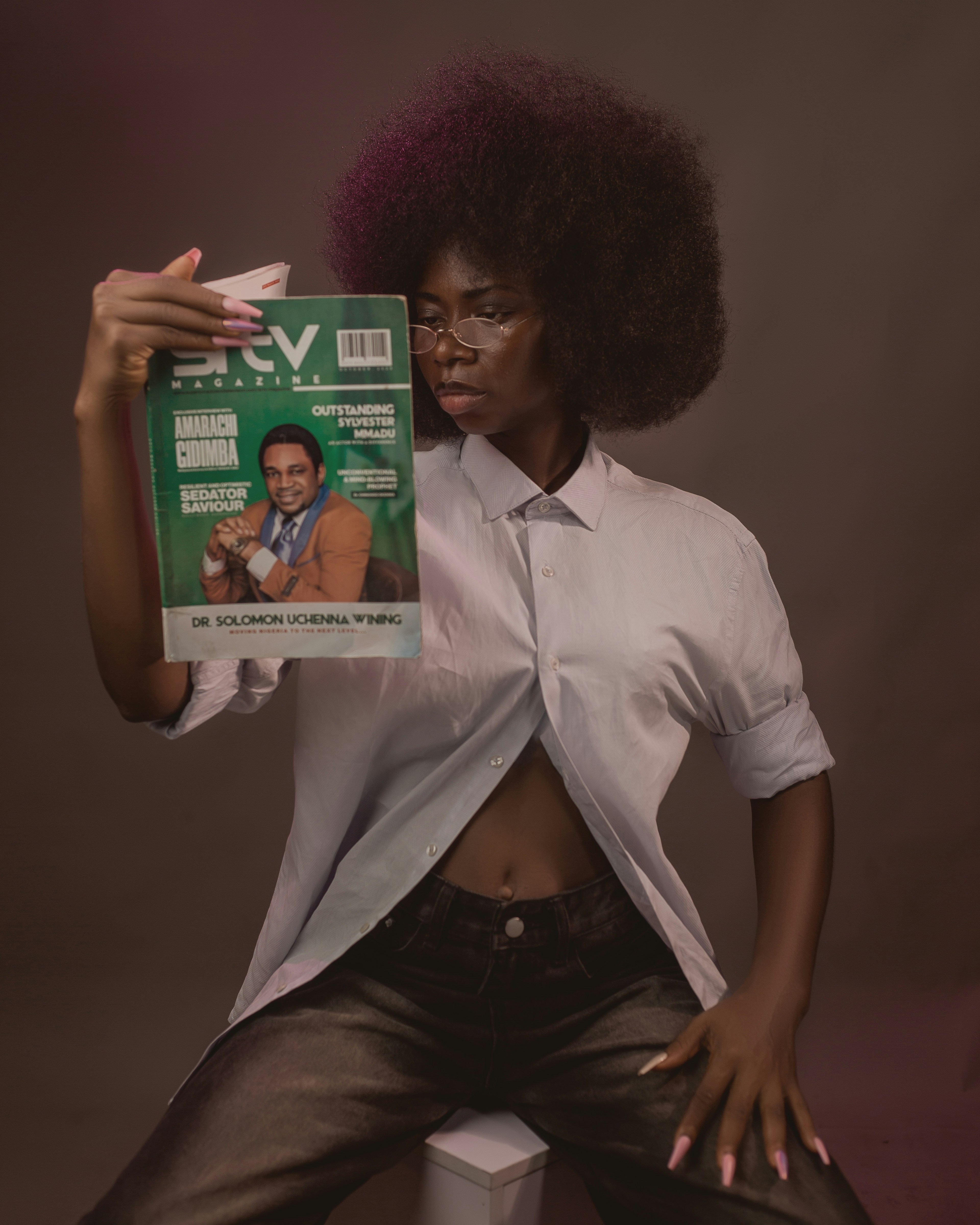 Reading the Frame: A Bold Individual with a Vintage Magazine