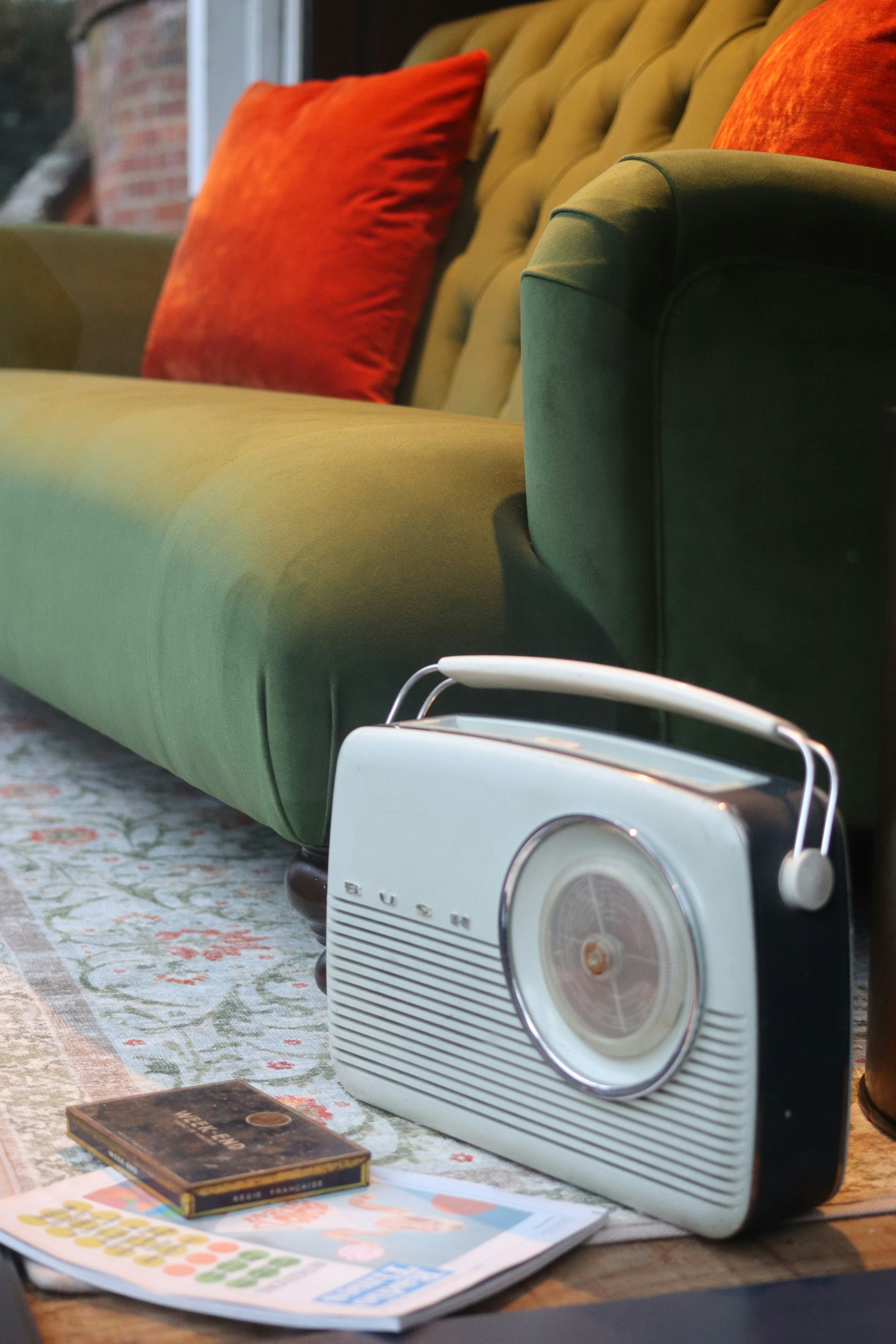 Retro Sofa Corner with Portable Radio and Vintage Accents